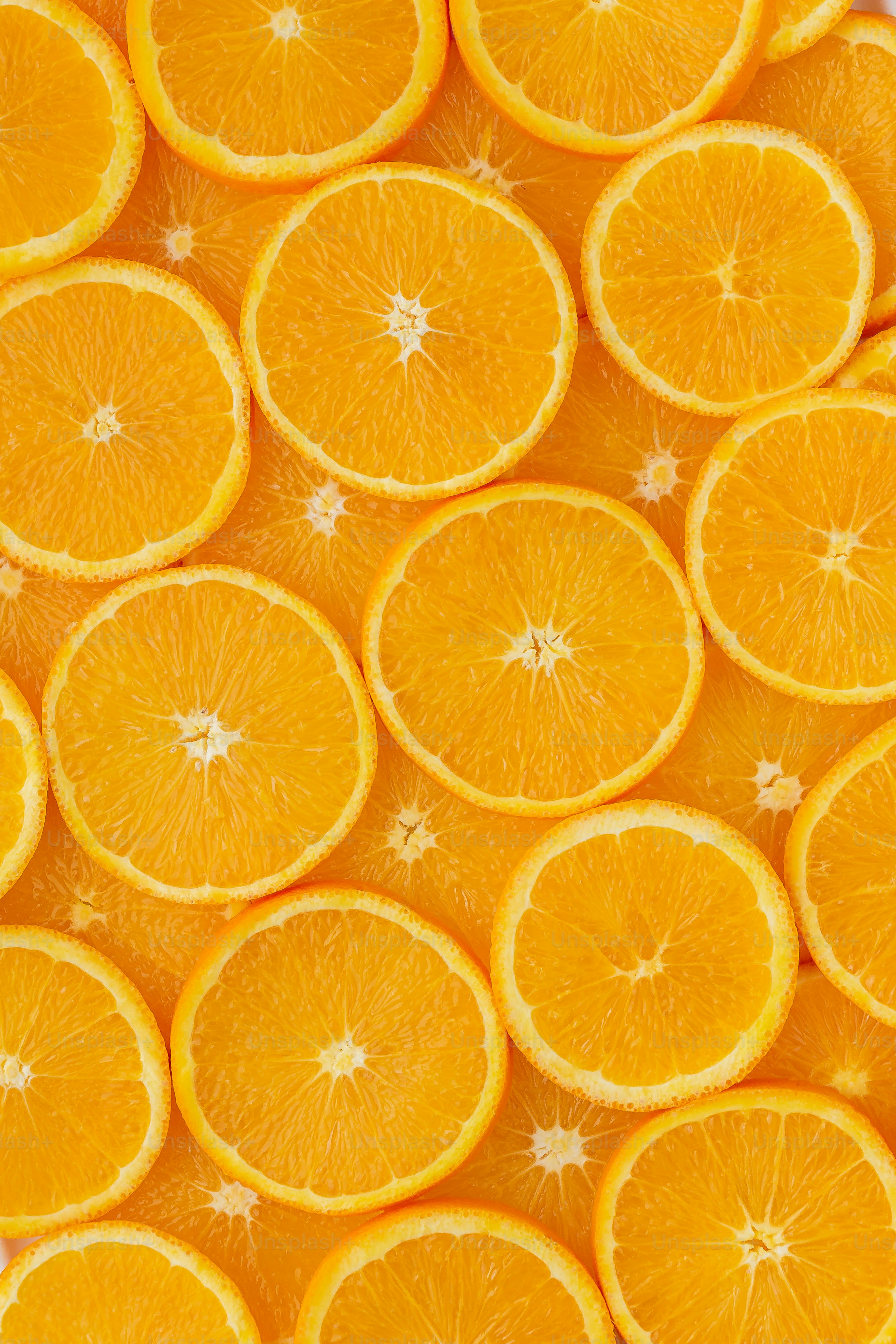 A bunch of oranges that are cut in half photo – Texture Image on Unsplash