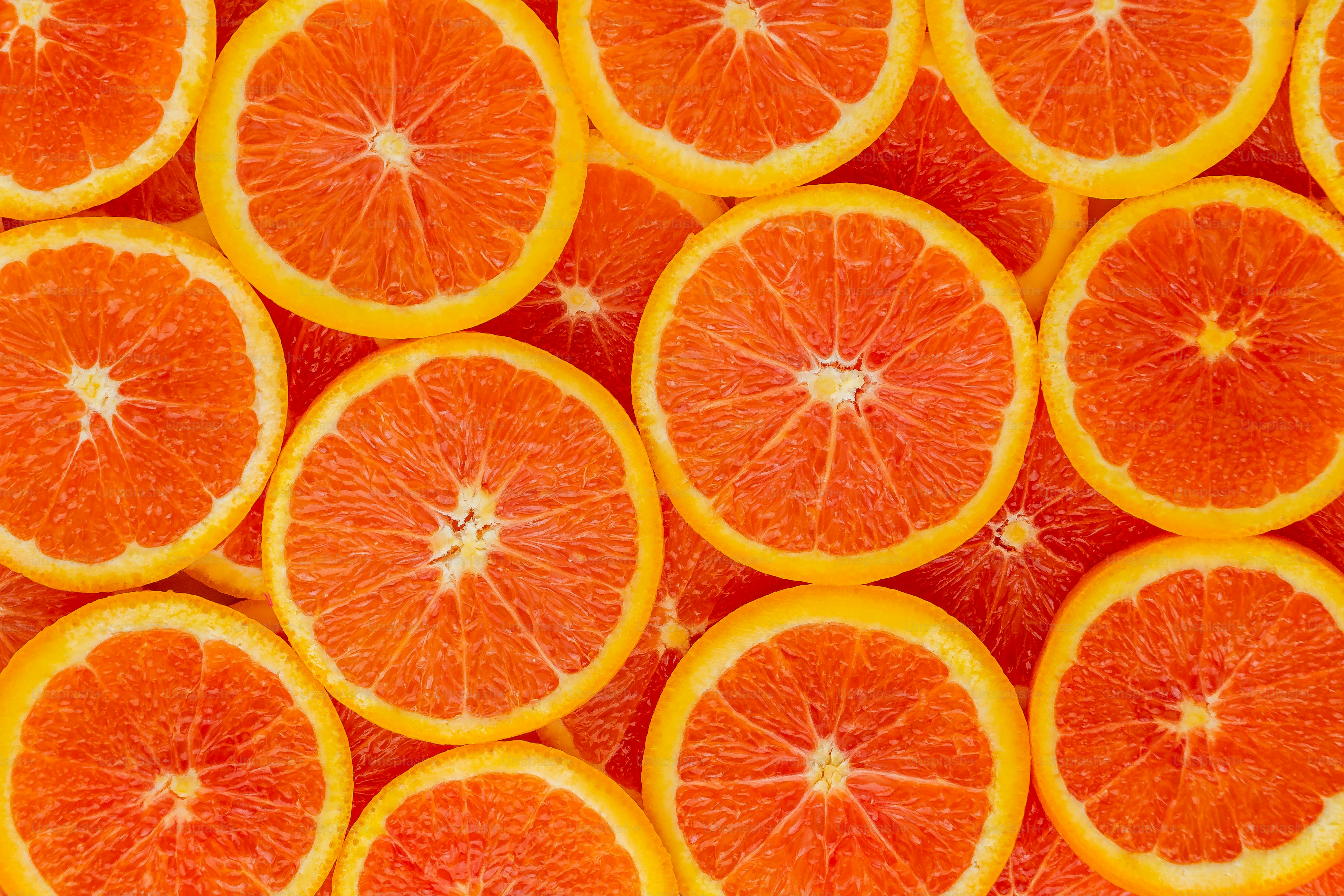A bunch of oranges that are cut in half photo – Citrus Image on Unsplash