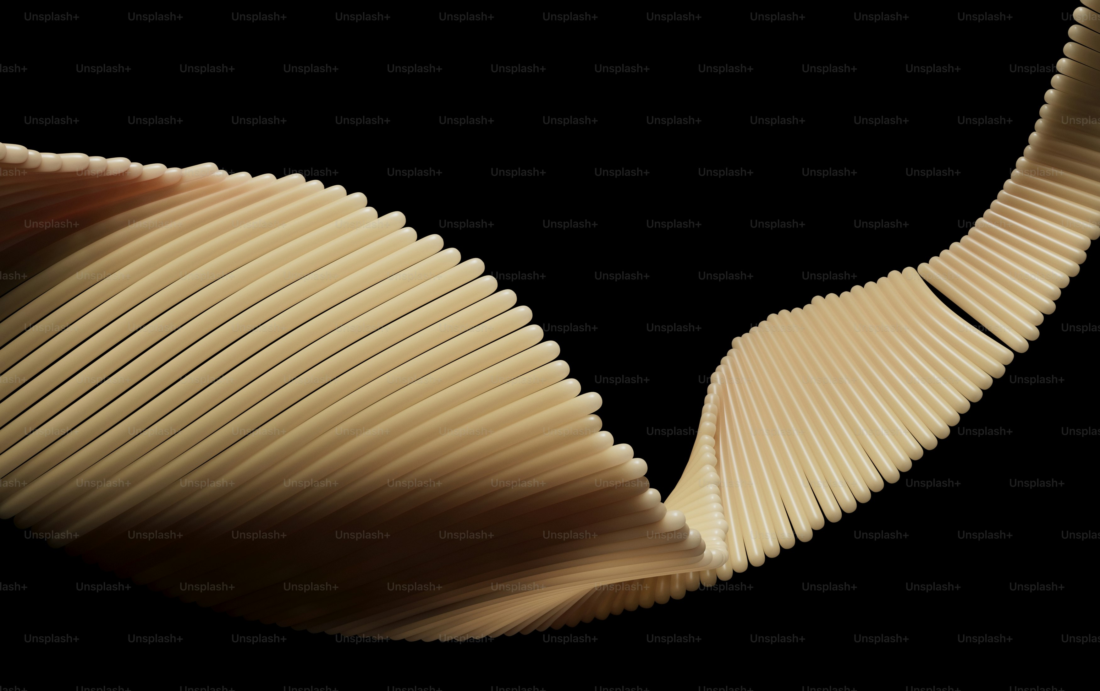 A close up of a curved object on a black background photo – Strands ...