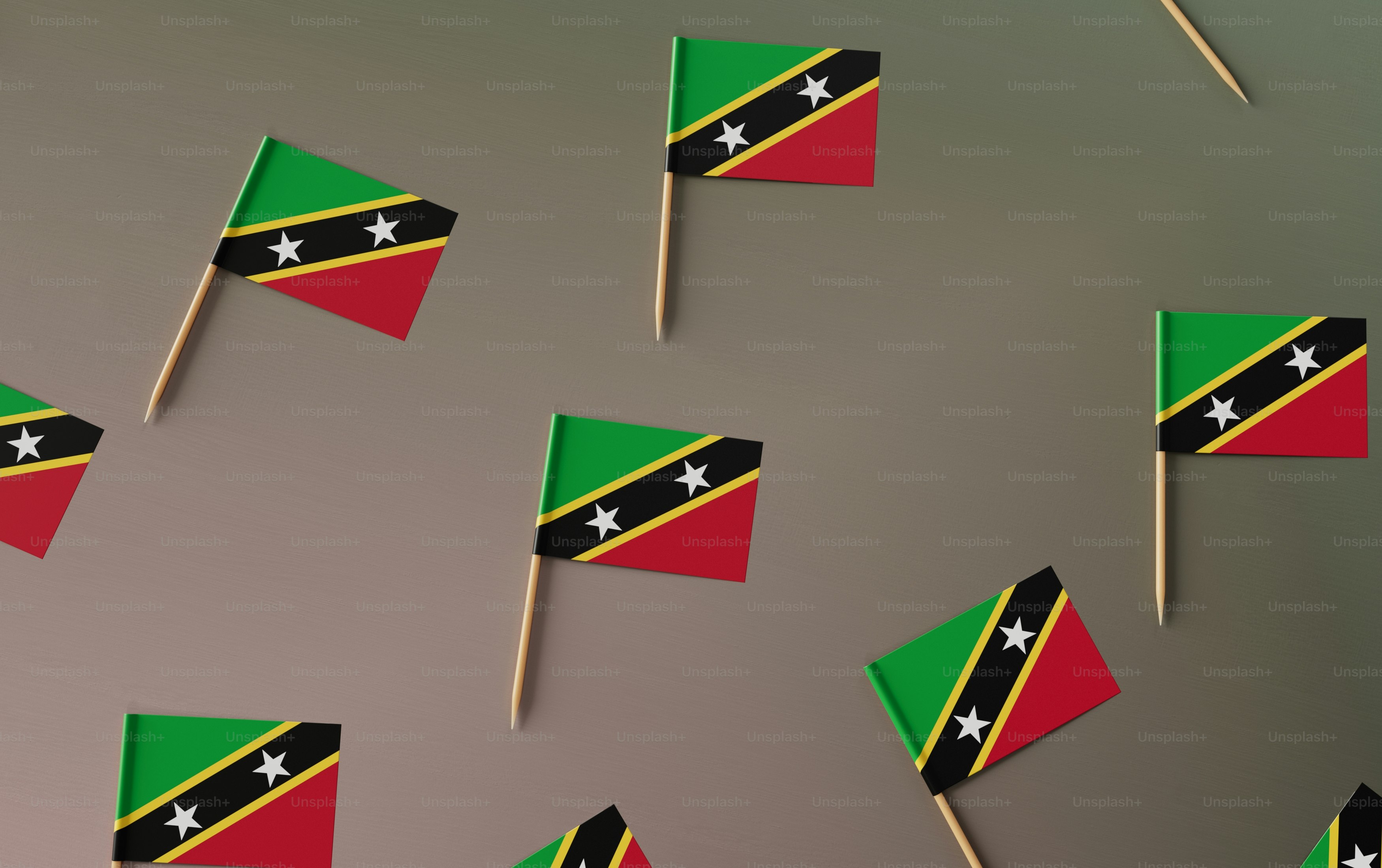 A bunch of flags that are on a stick photo – Wallpaper Image on Unsplash