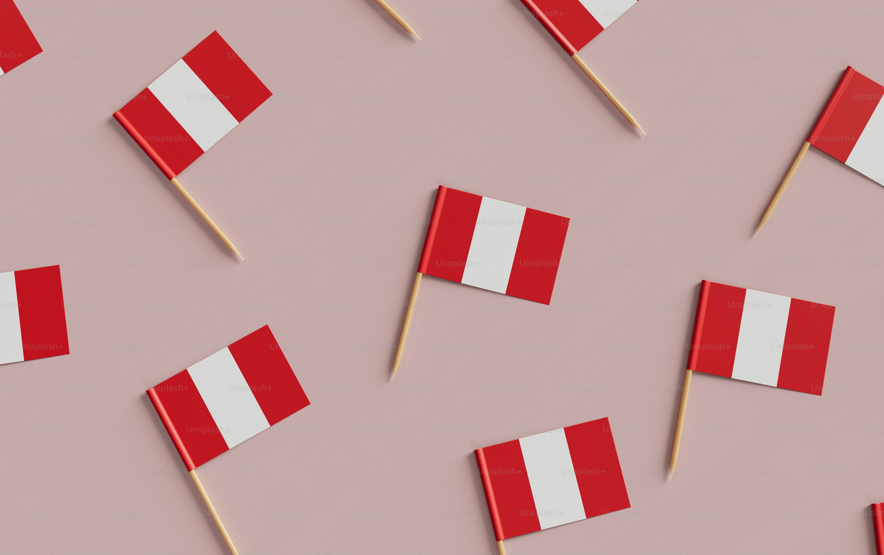 A group of small red, white and blue flags photo – Flags Image on Unsplash