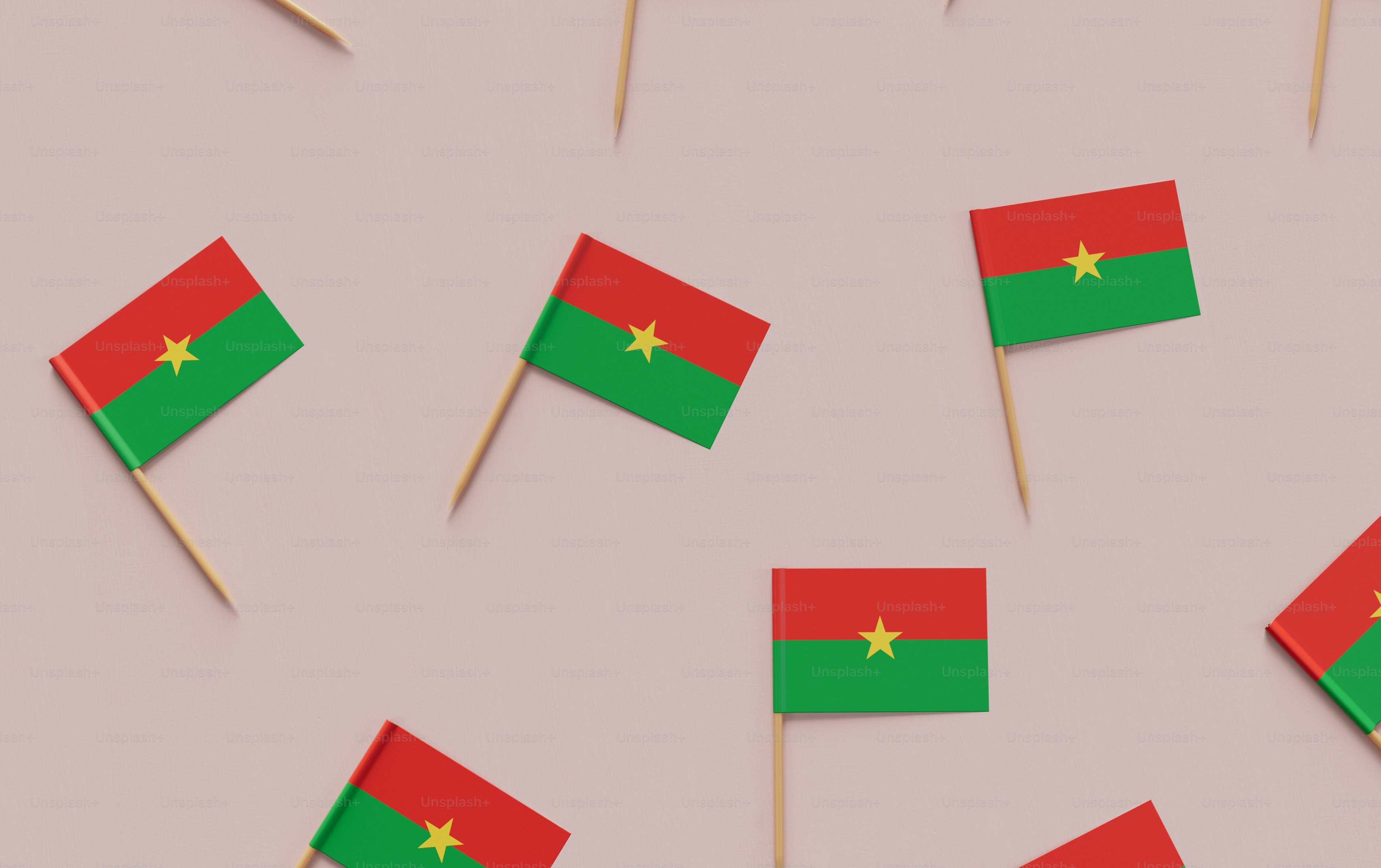 A group of small flags sitting on top of a table photo – 3d Image on ...