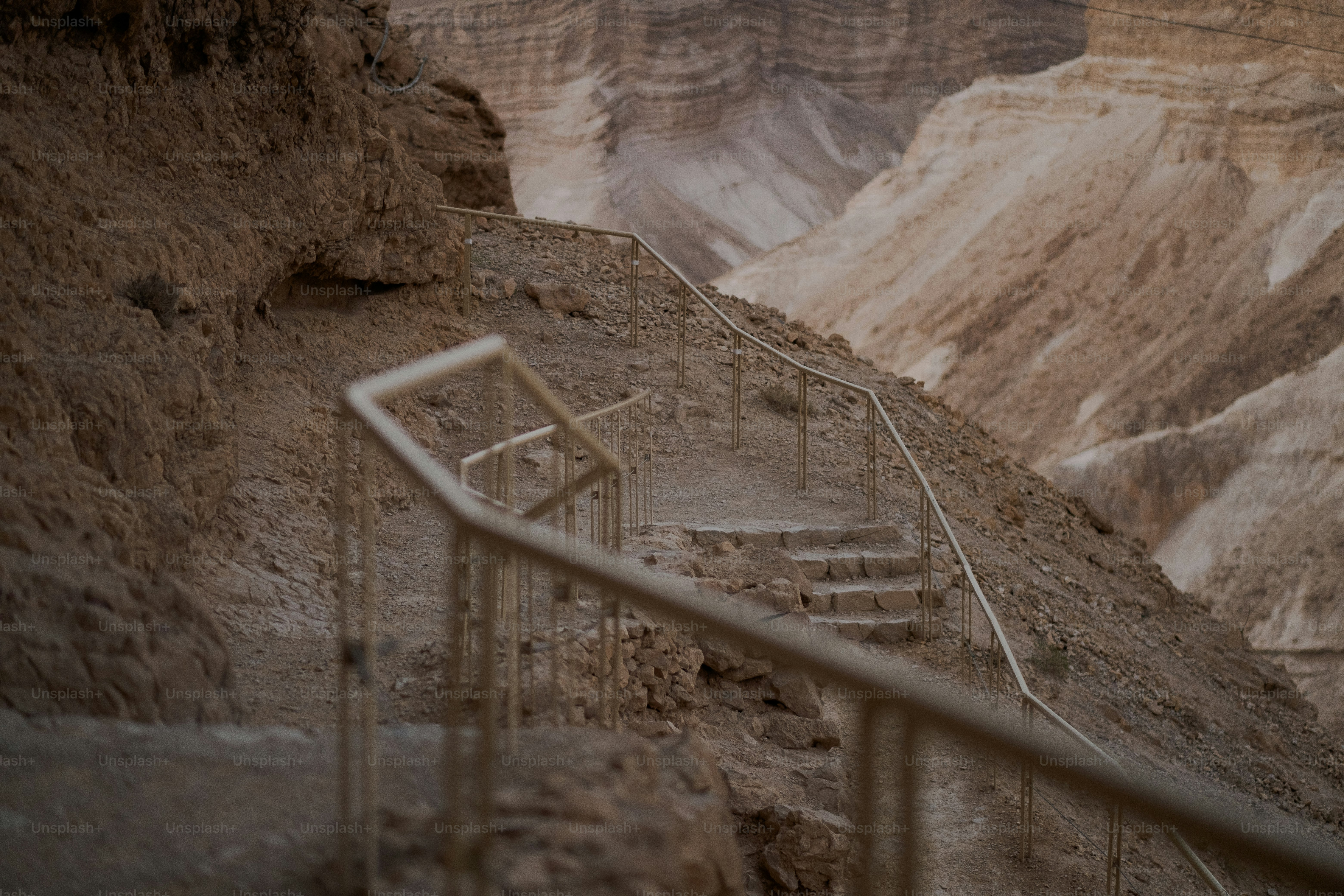 A set of stairs leading up to a cliff photo – Steps Image on Unsplash