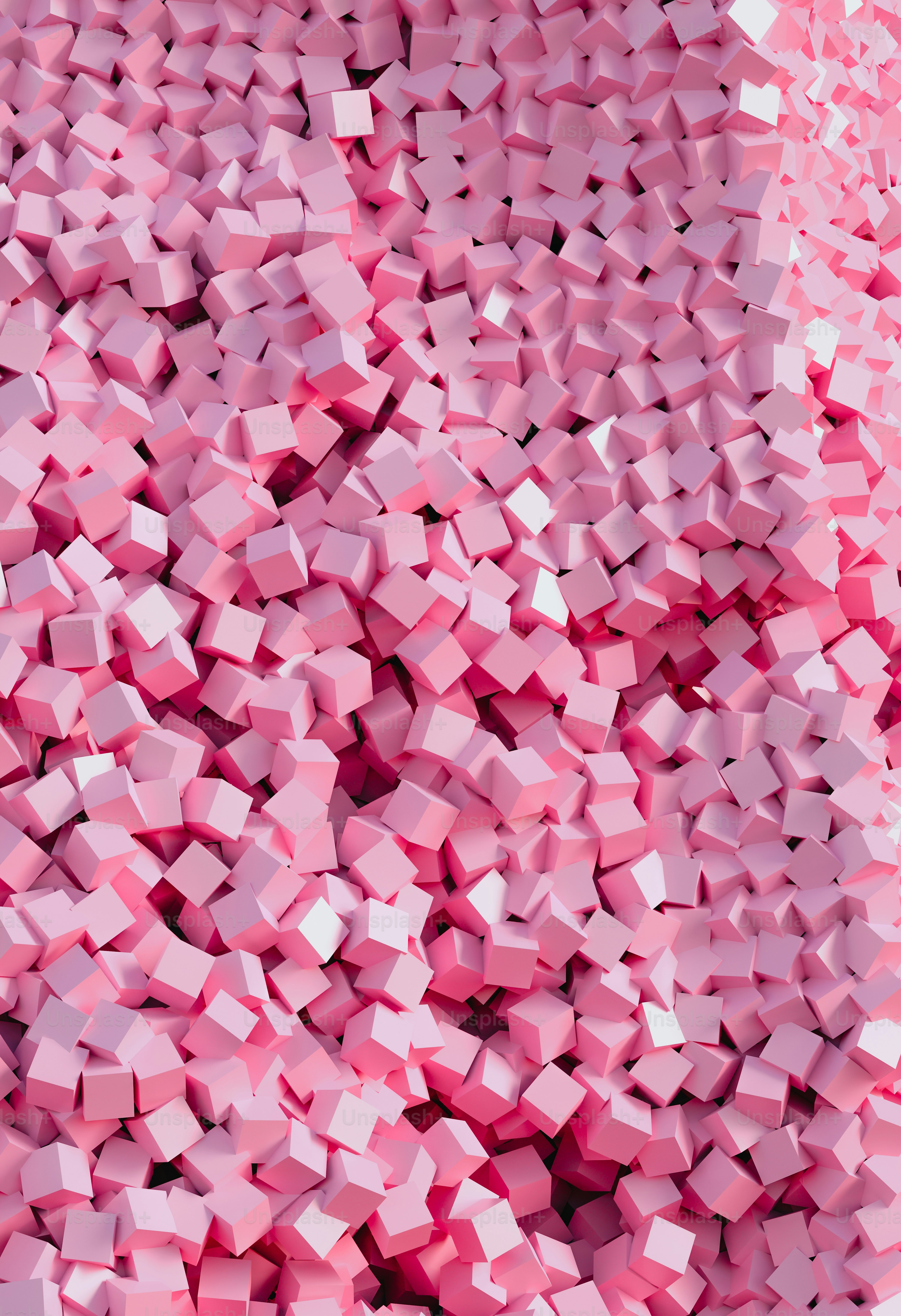 A large pile of pink cubes in the middle of a room photo – Pink ...