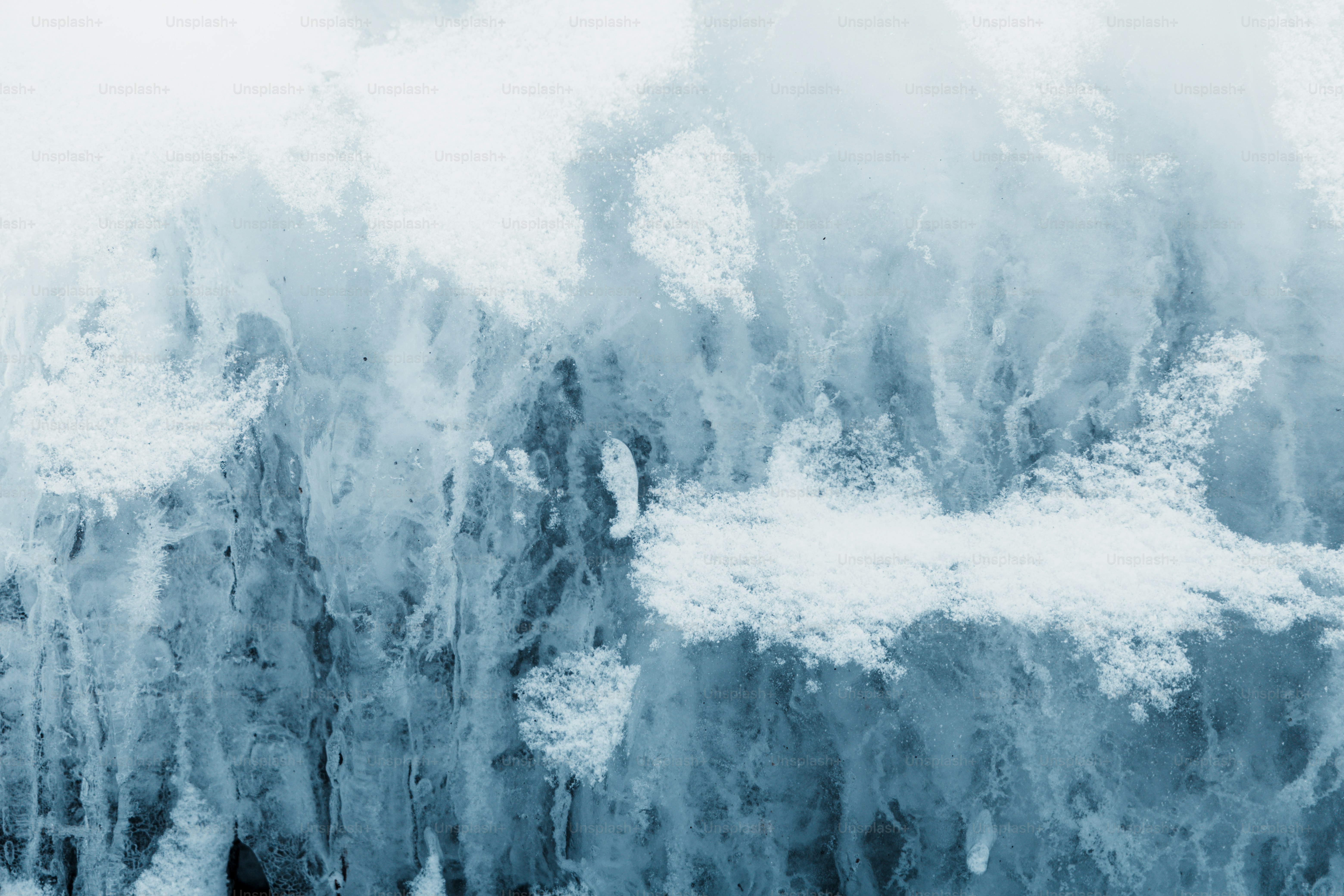 A close up of ice on the side of a mountain photo – Close up Image on ...
