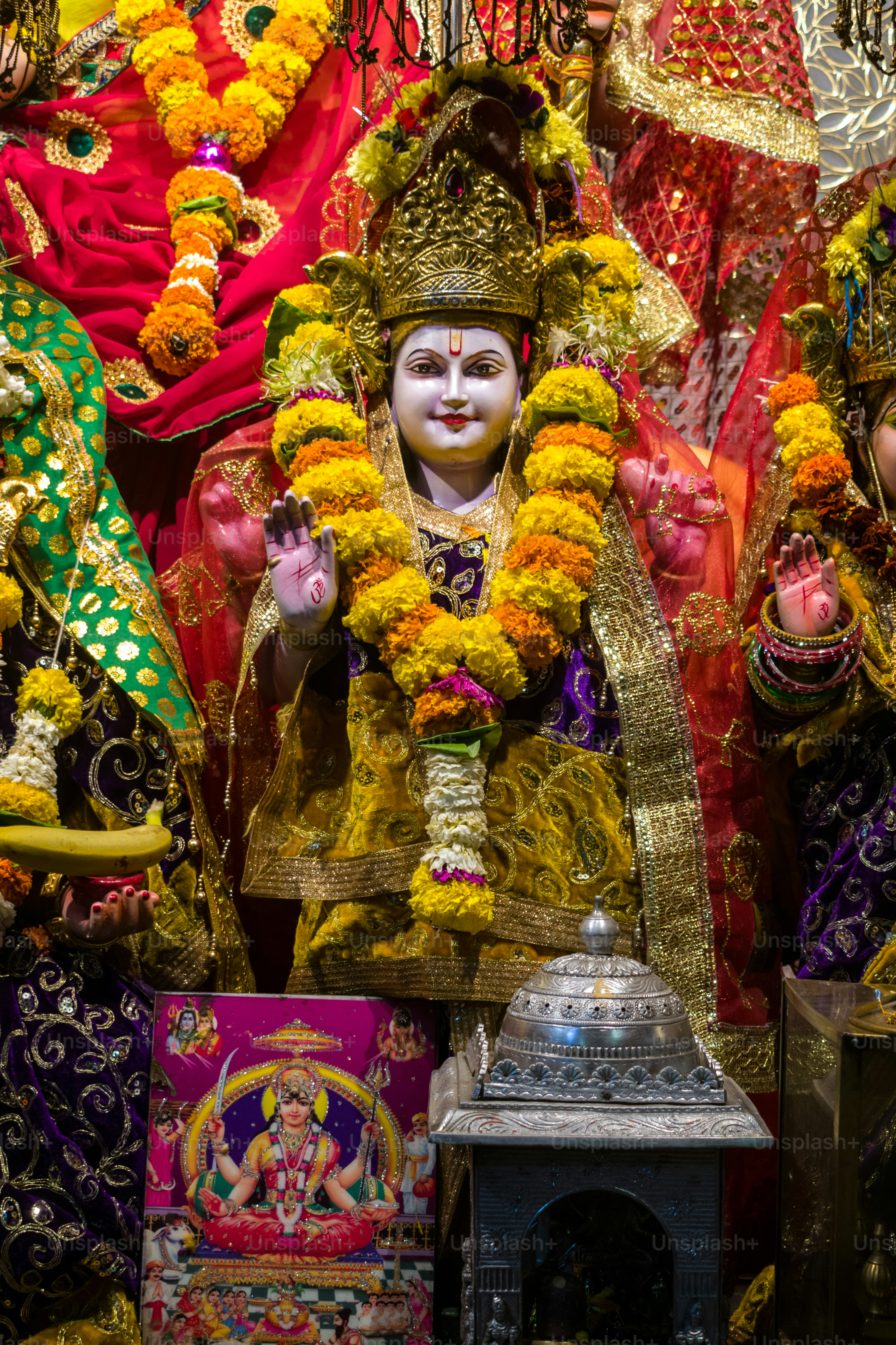 A group of people dressed in colorful costumes photo – Durga maa Image ...