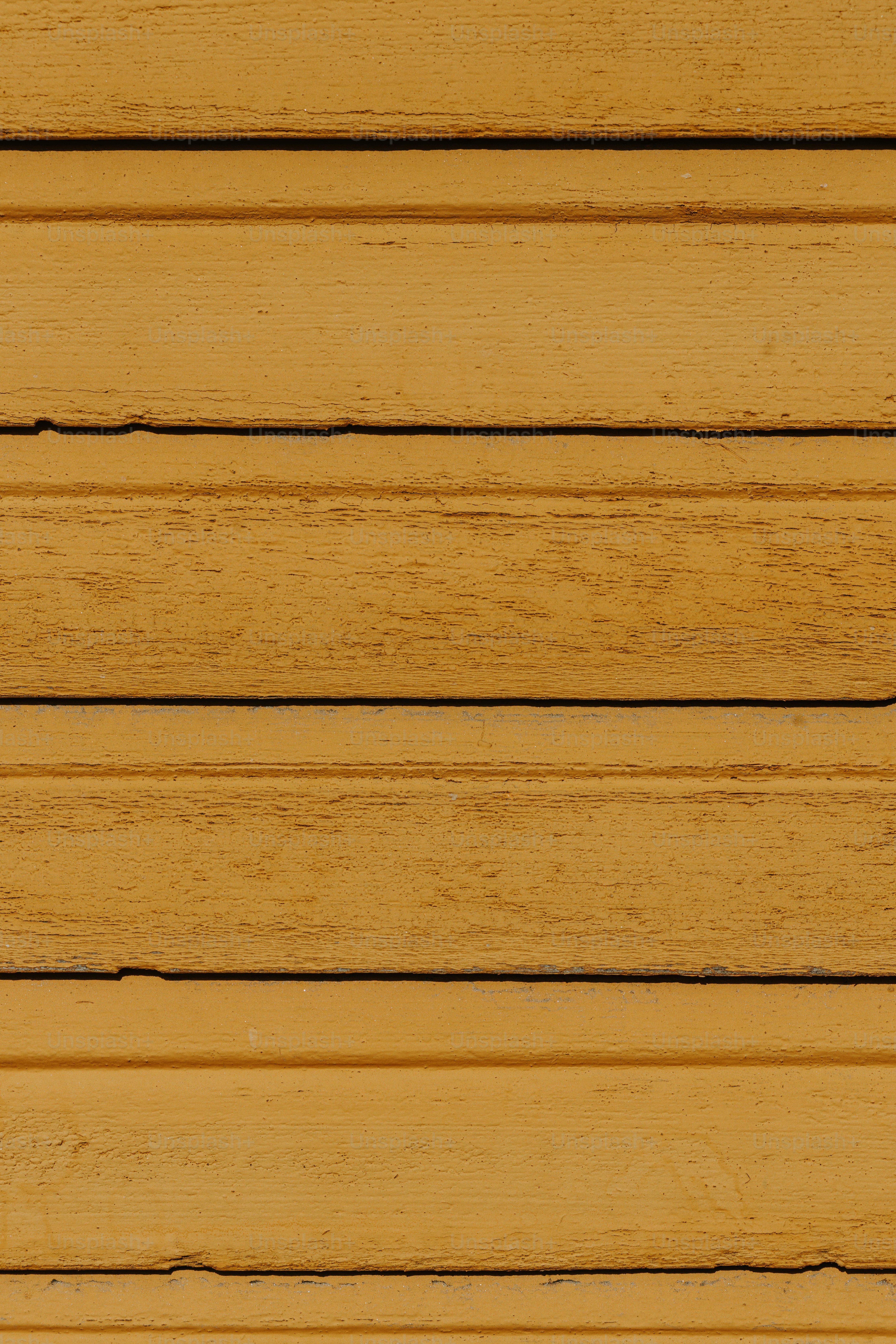 A close up of a wooden planks with a red stop sign on it photo ...