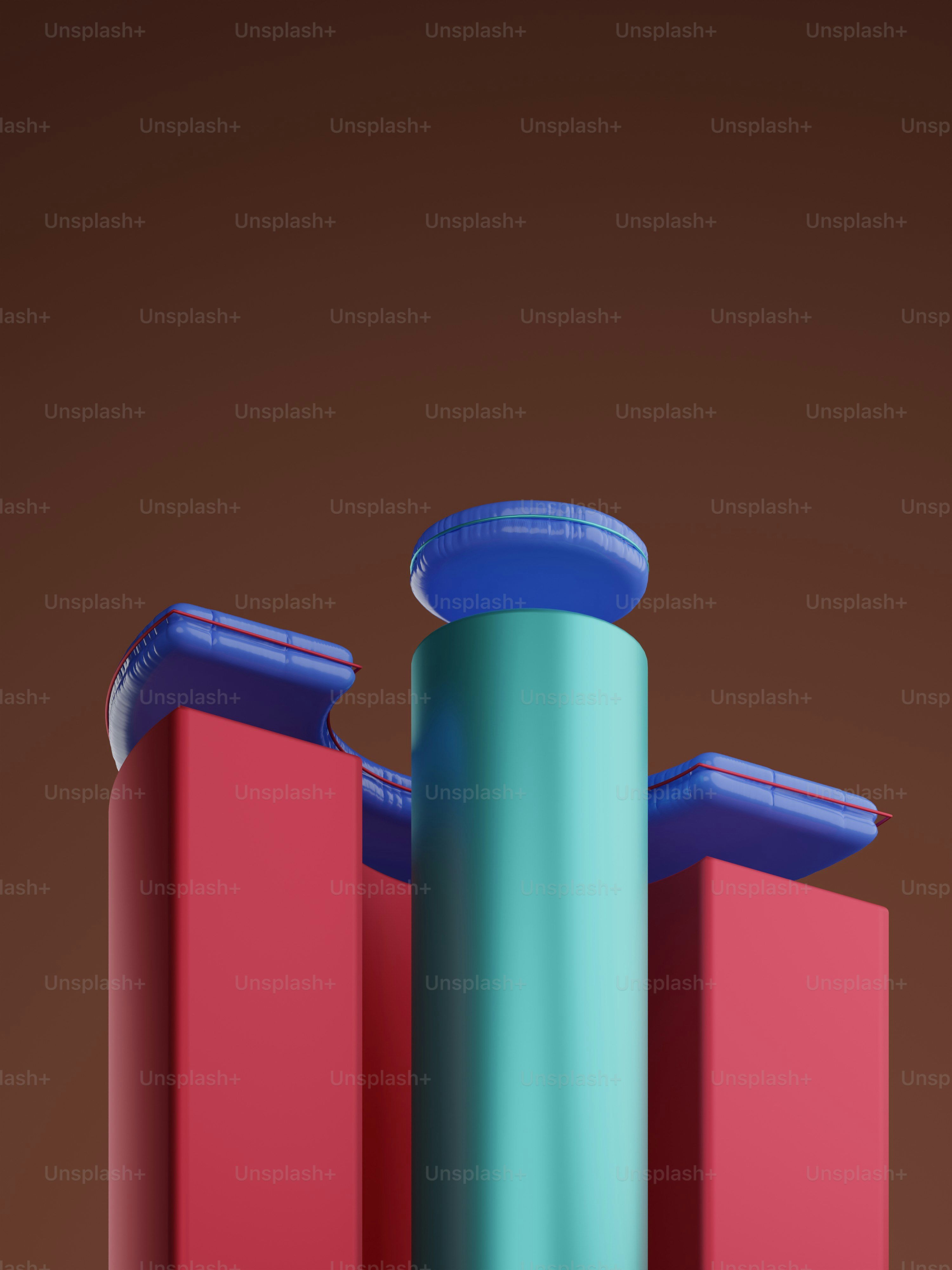 A tall blue and red object on a brown background photo – Column Image ...