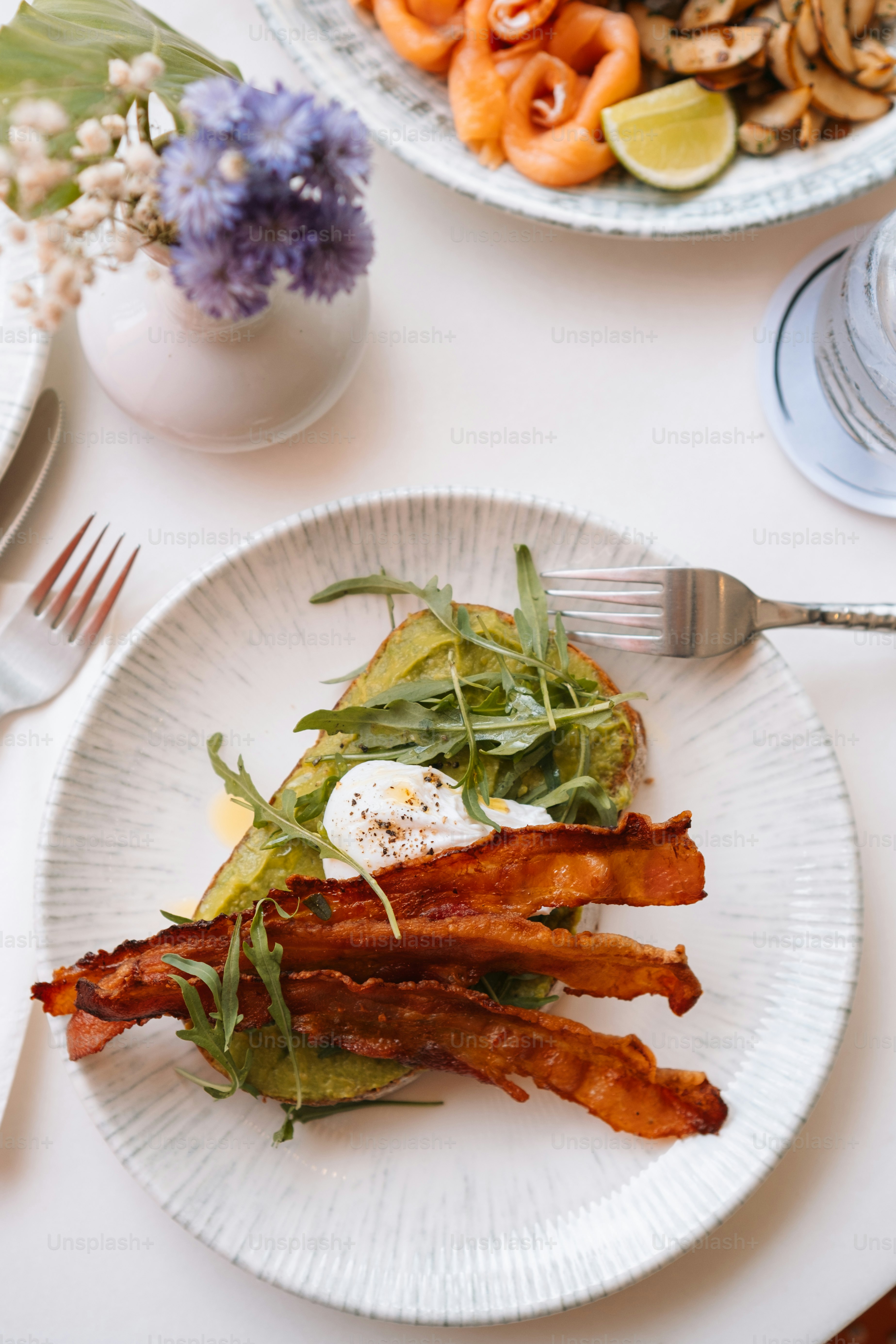A White Plate Topped With Bacon And An Egg Photo Bacon And Eggs Image