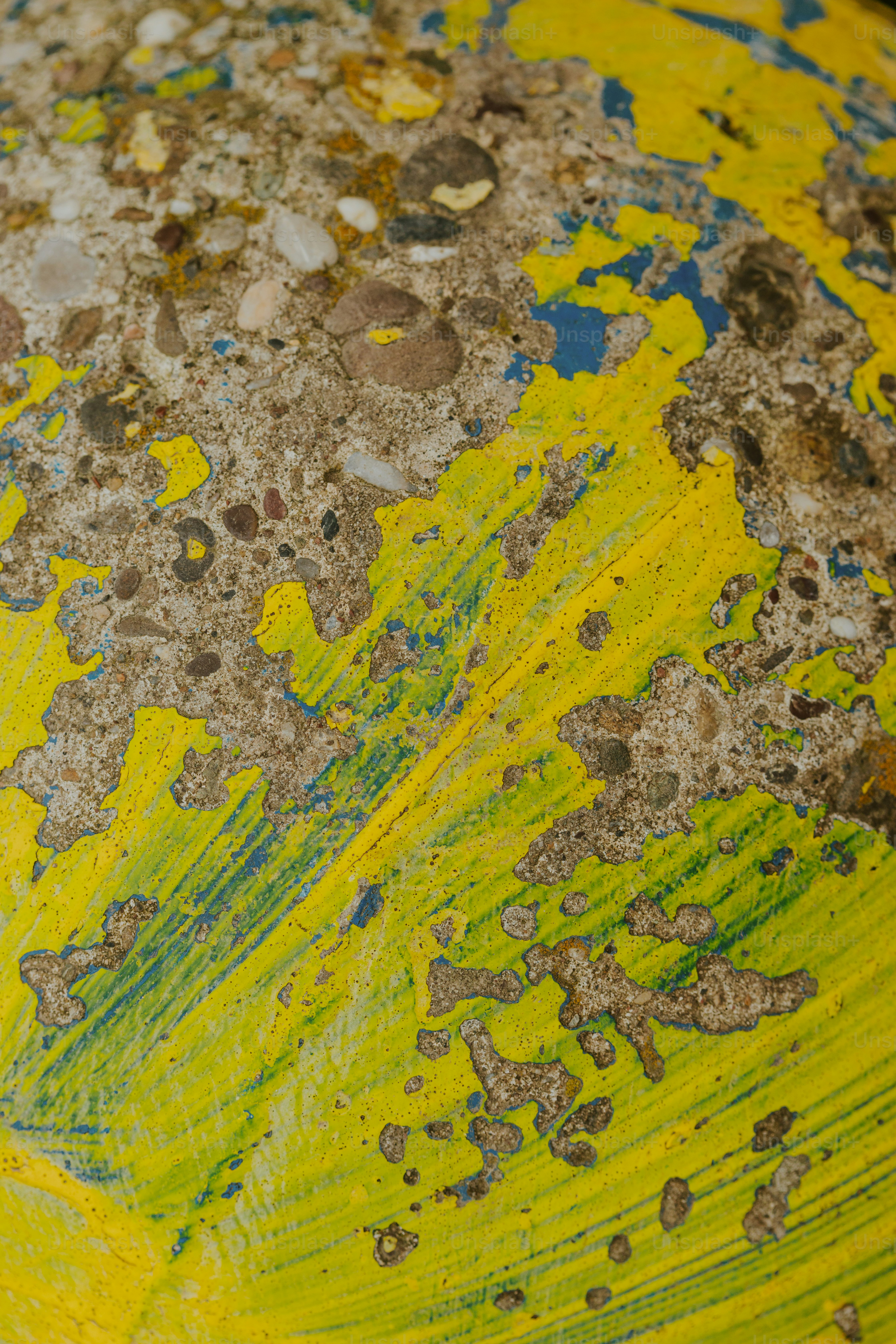 A close up of a yellow and blue object photo – Texture Image on Unsplash