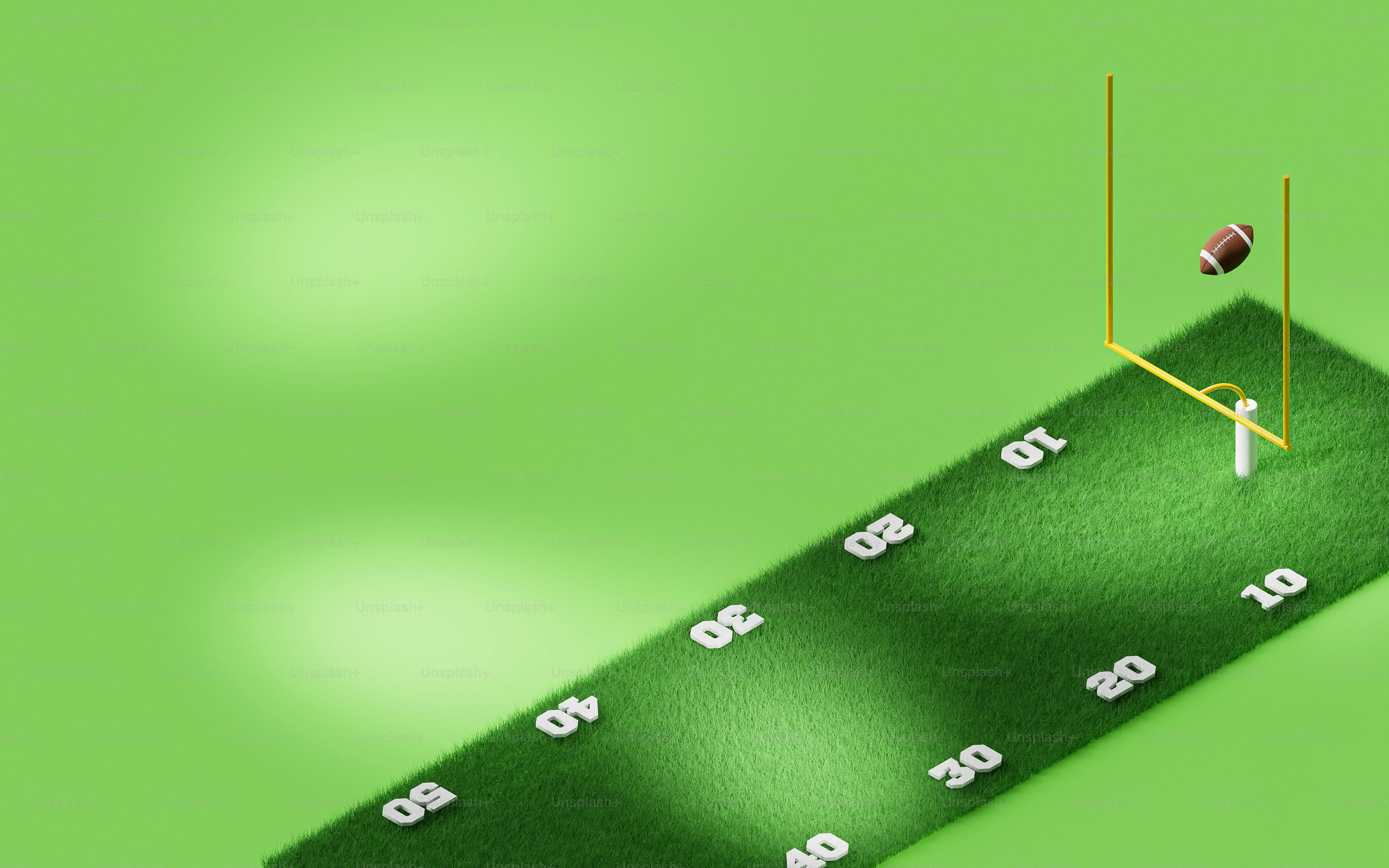 A football field with a goal and a ball photo – Touchdown Image on Unsplash