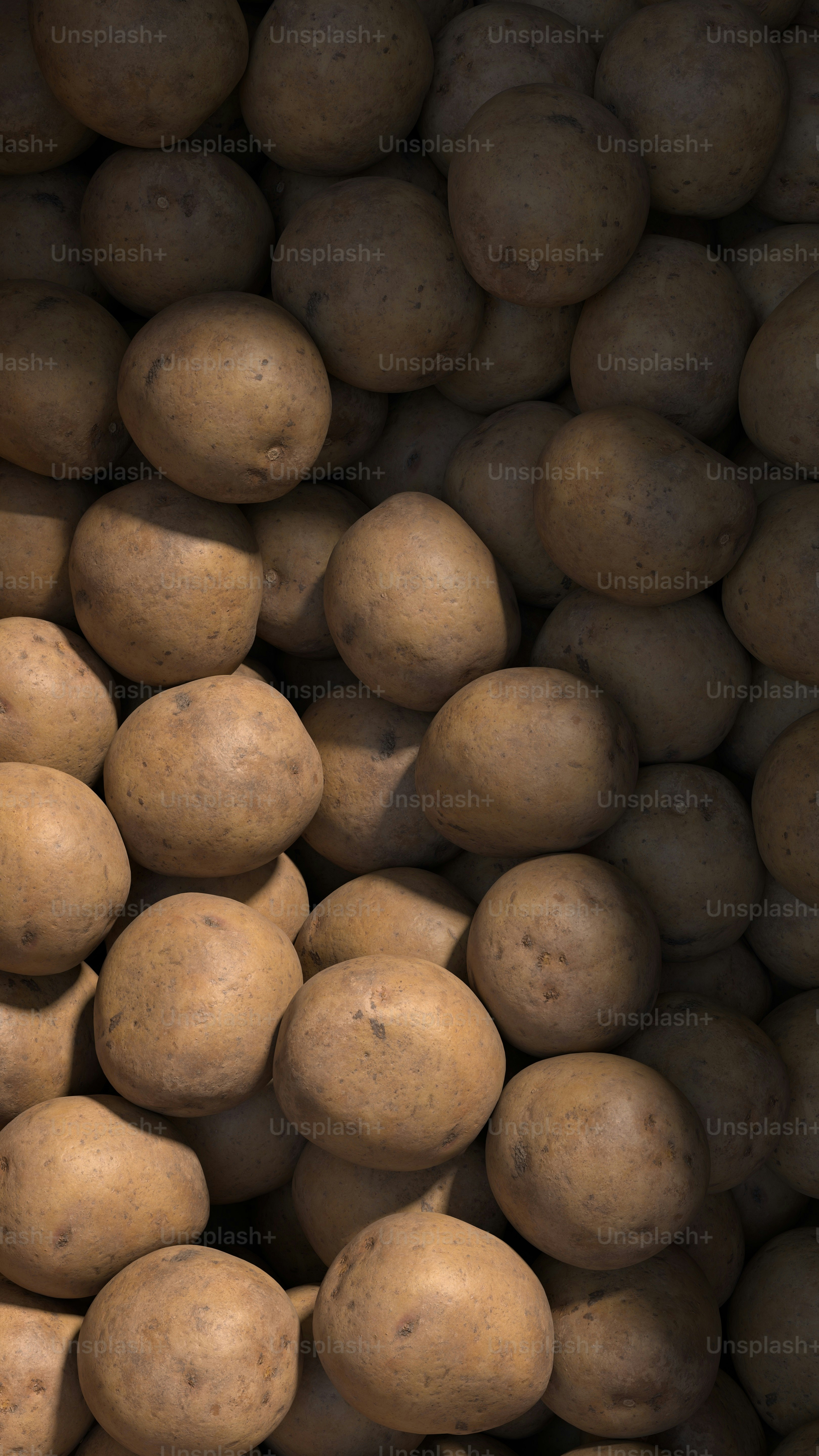 A pile of potatoes piled on top of each other photo – Potato Image on ...