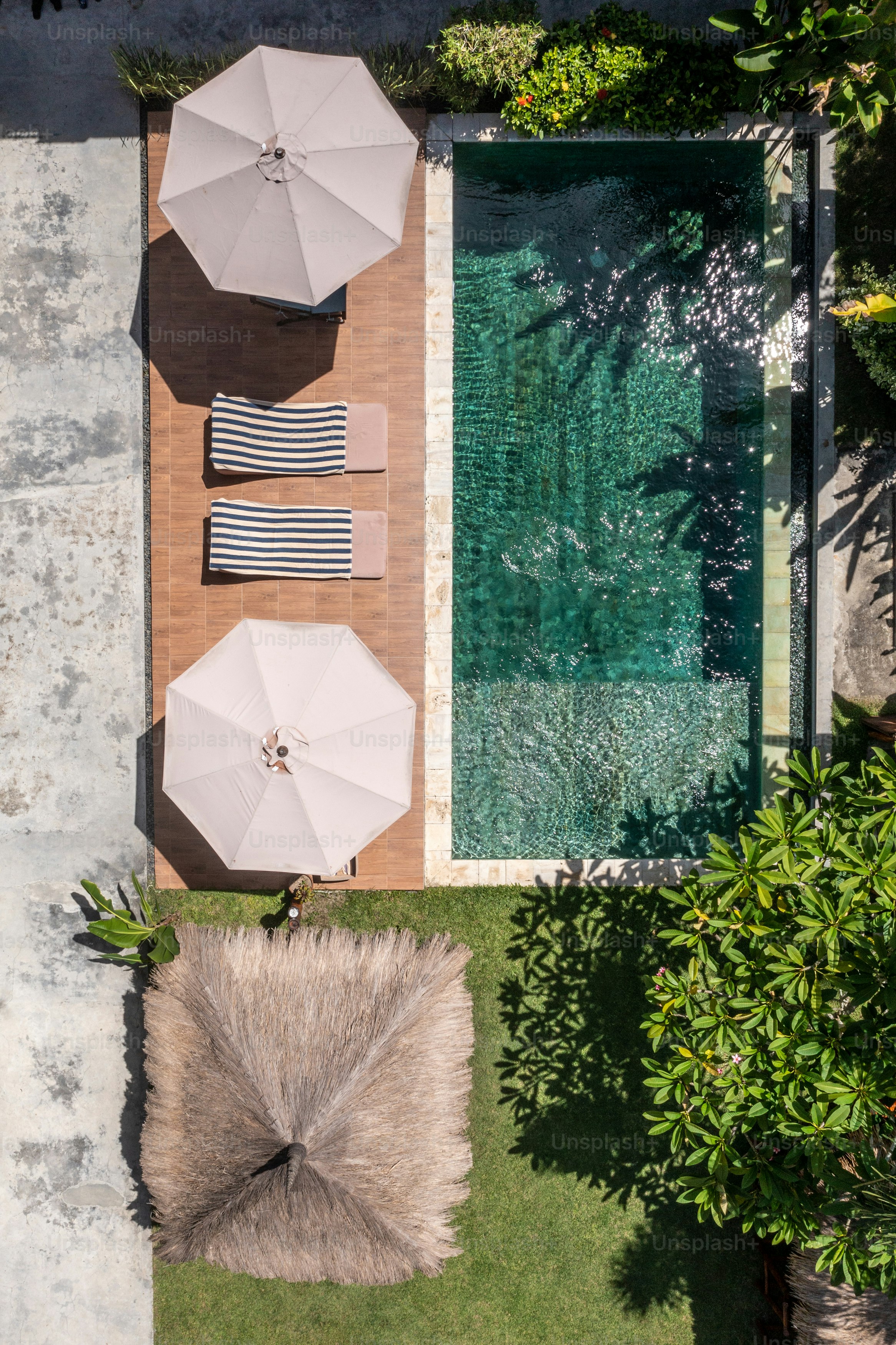 An overhead view of a patio with umbrellas photo – Interior design ...