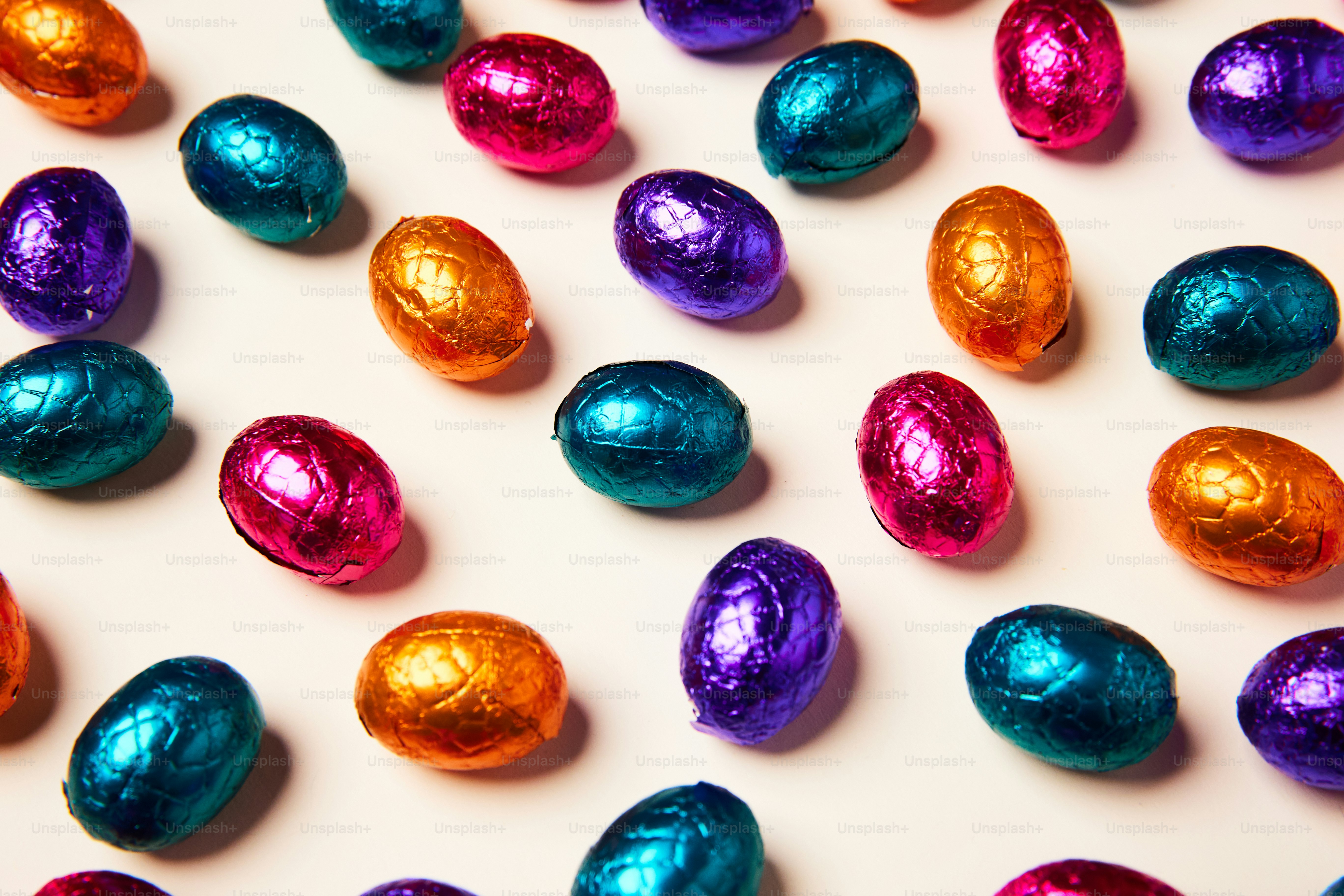 A happy easter message surrounded by chocolate eggs photo – Easter ...