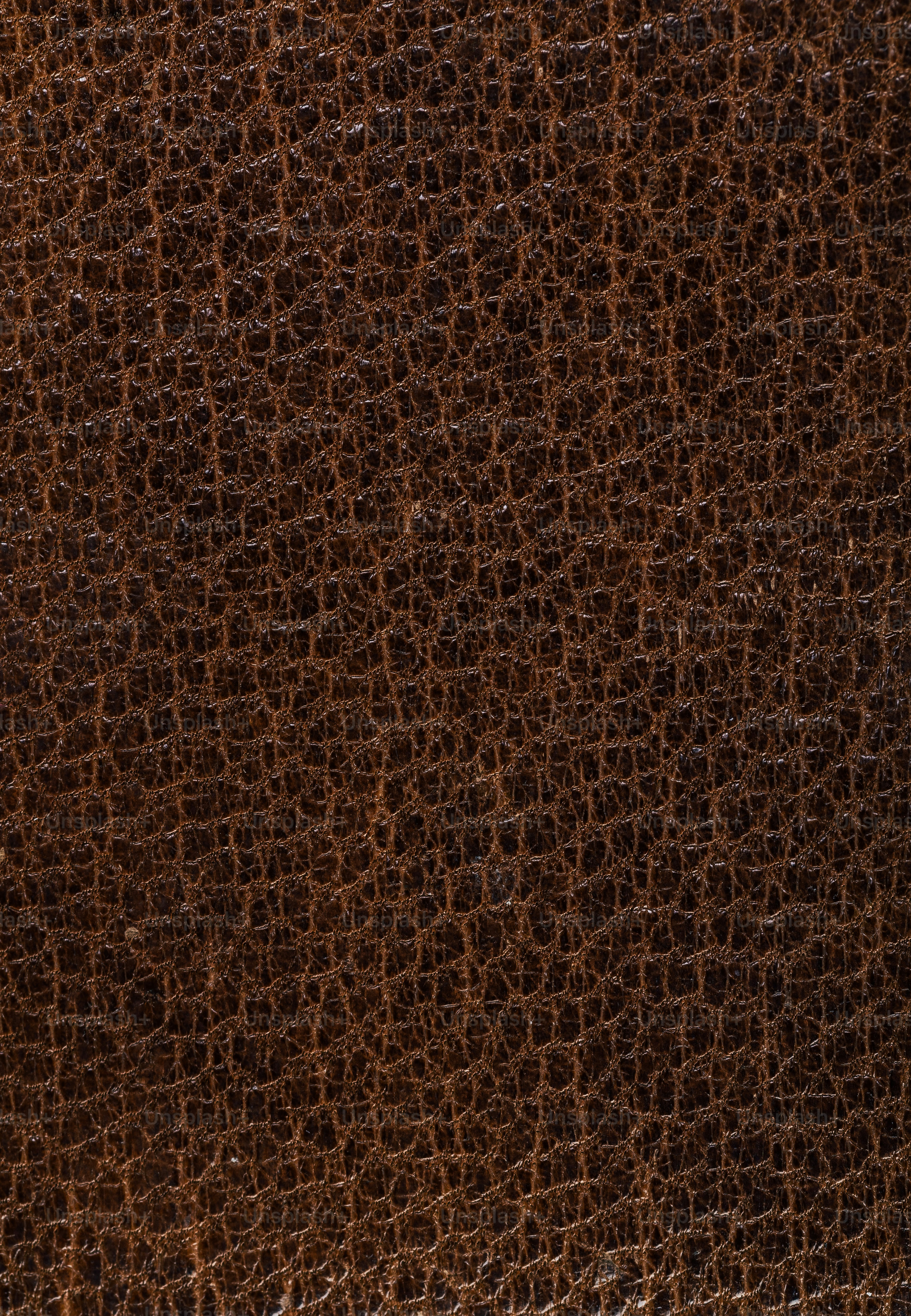 A close up of a brown leather texture photo – Leather texture Image on ...