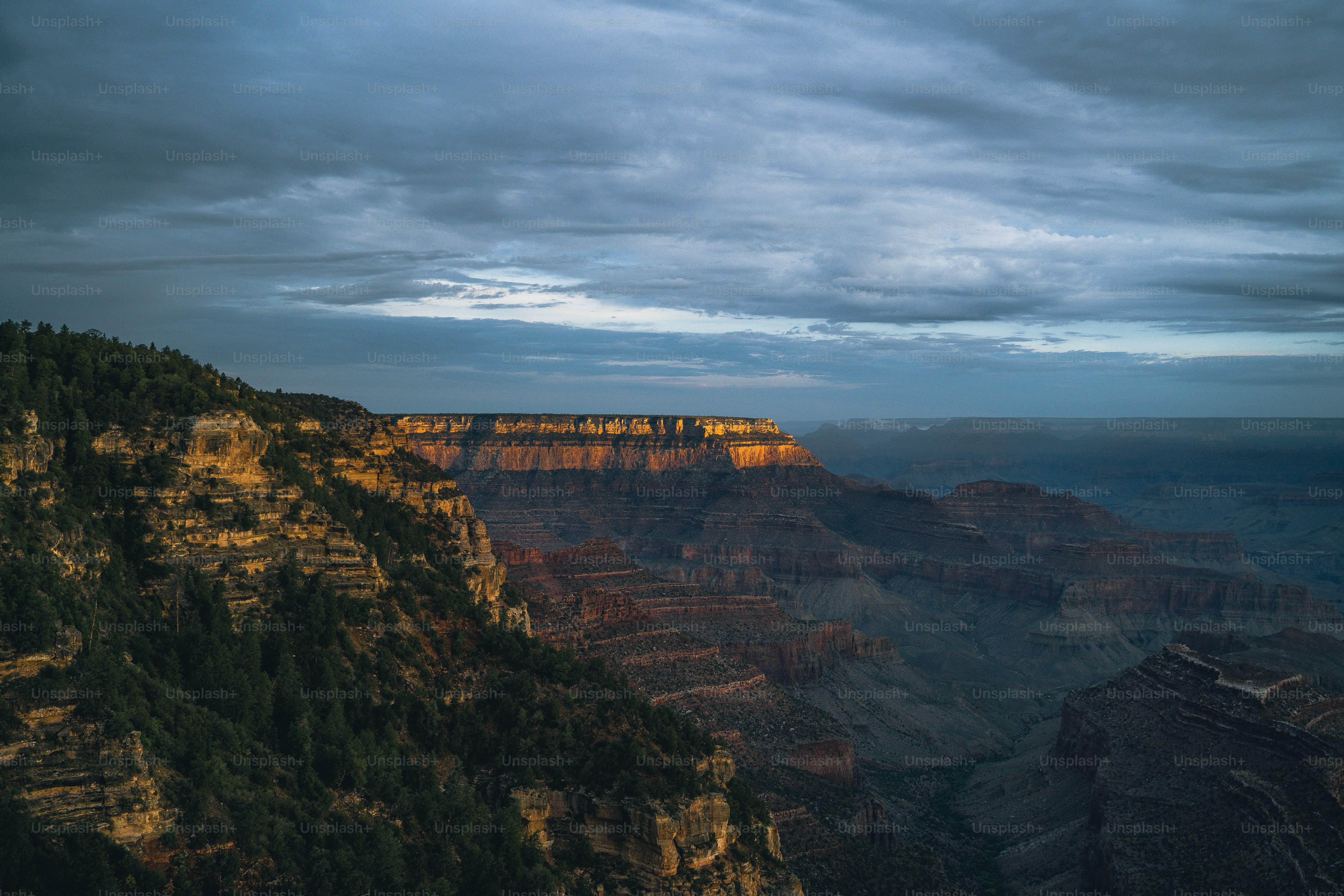 A view of the grand canyon from the top of a mountain photo – Grand ...
