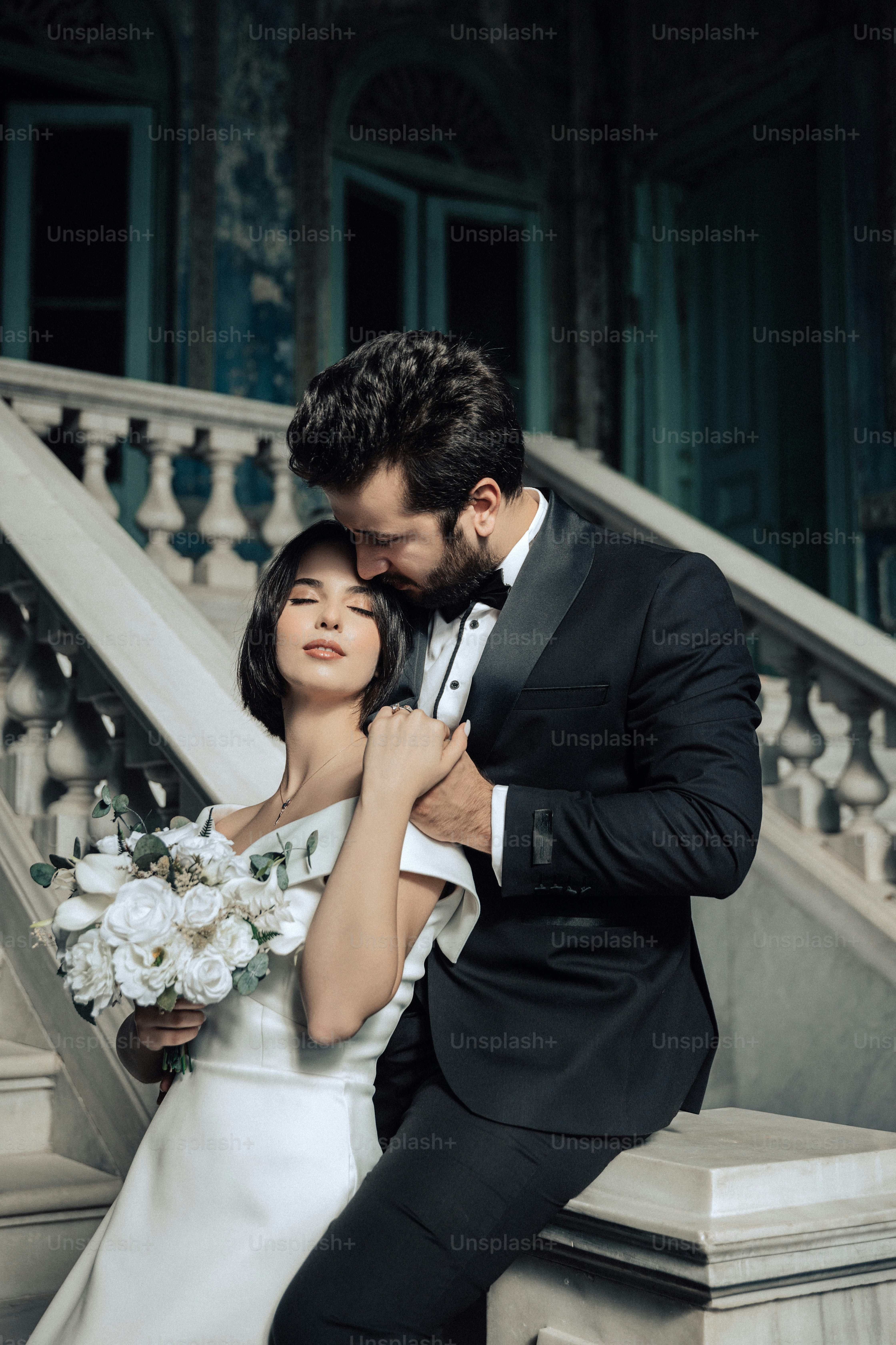 A bride and groom pose for a wedding photo photo – Wedding photo Image ...