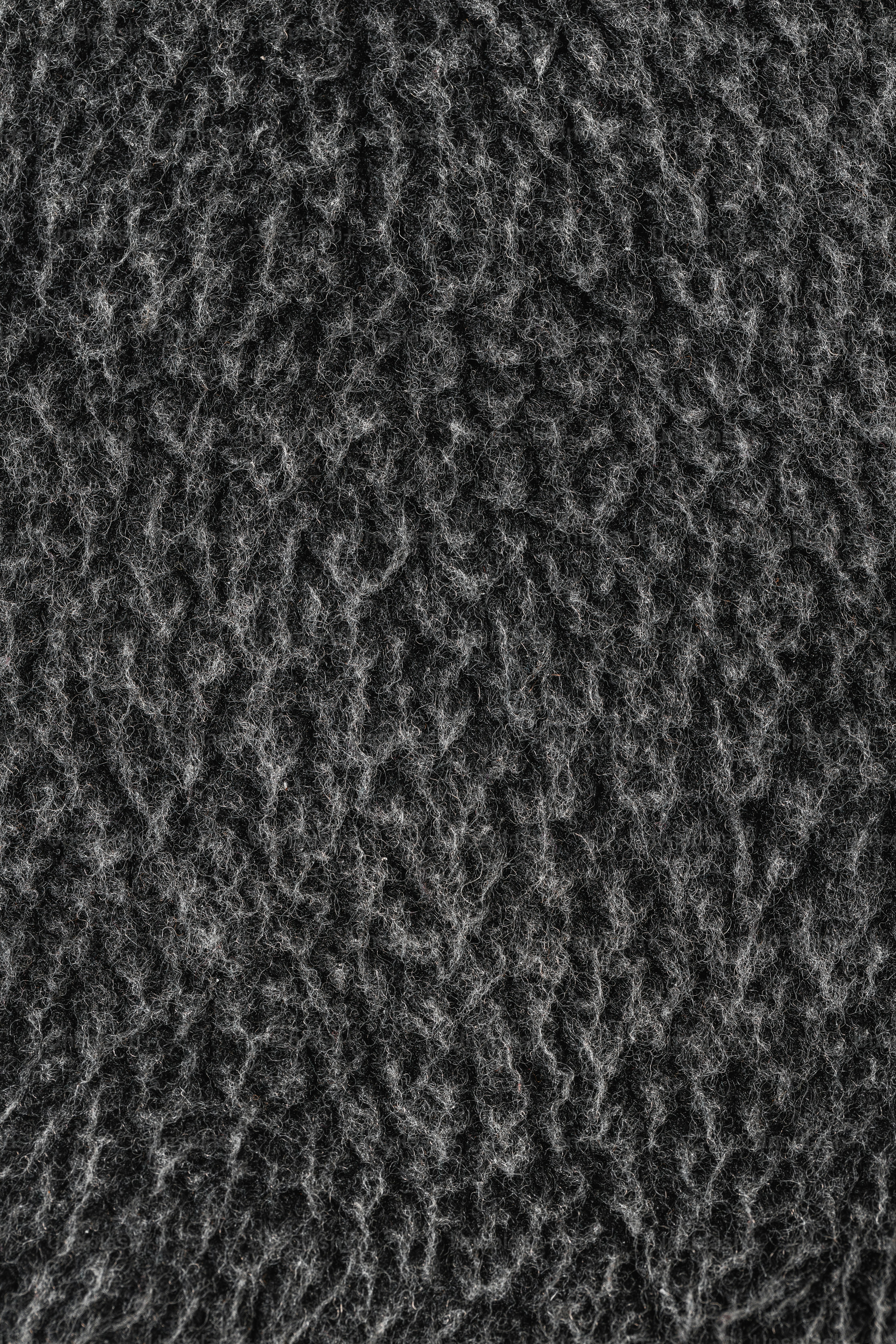 A close up of a black and white textured surface photo – Wool texture ...