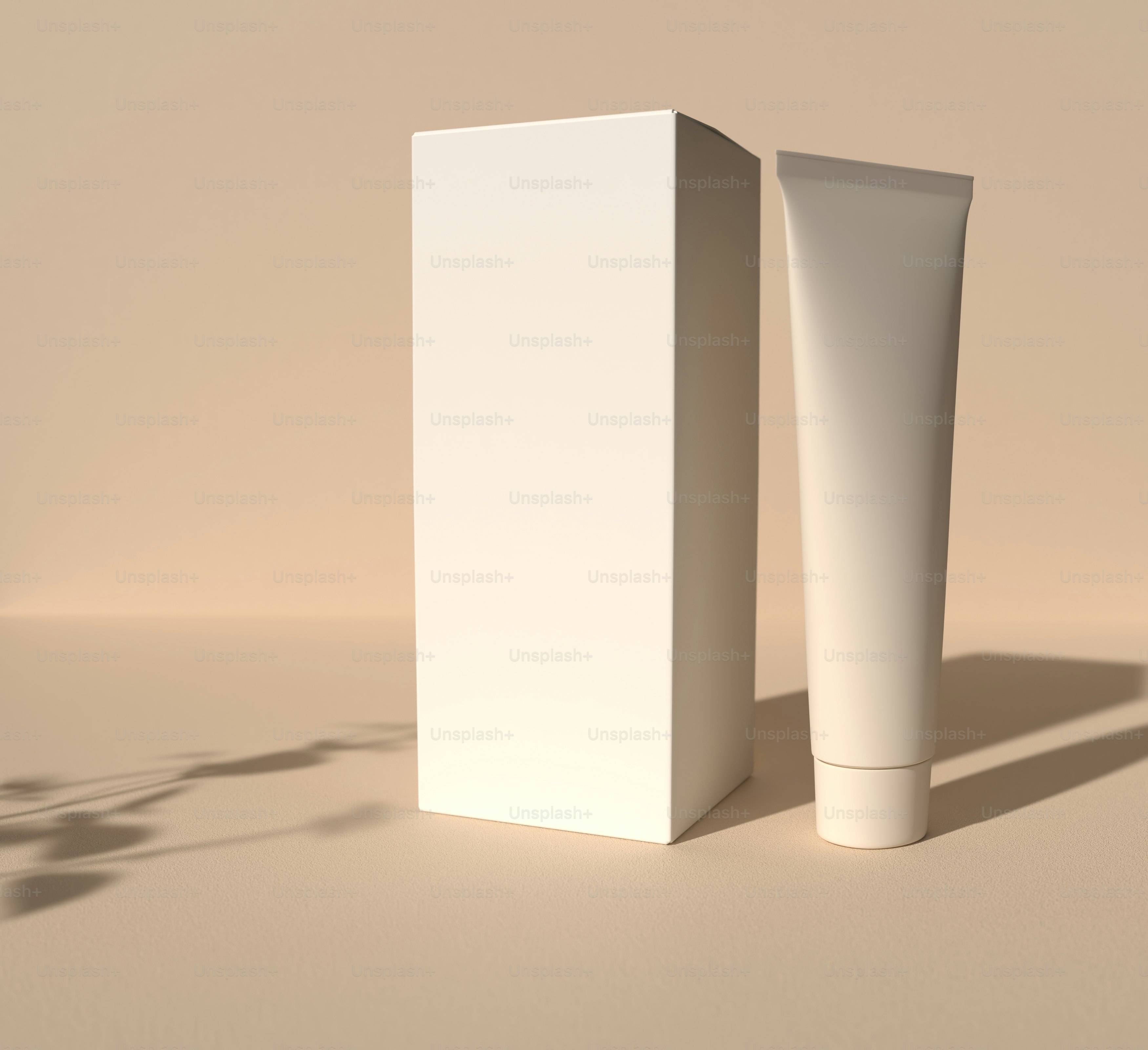 A tube of toothpaste next to a box photo – Product Image on Unsplash