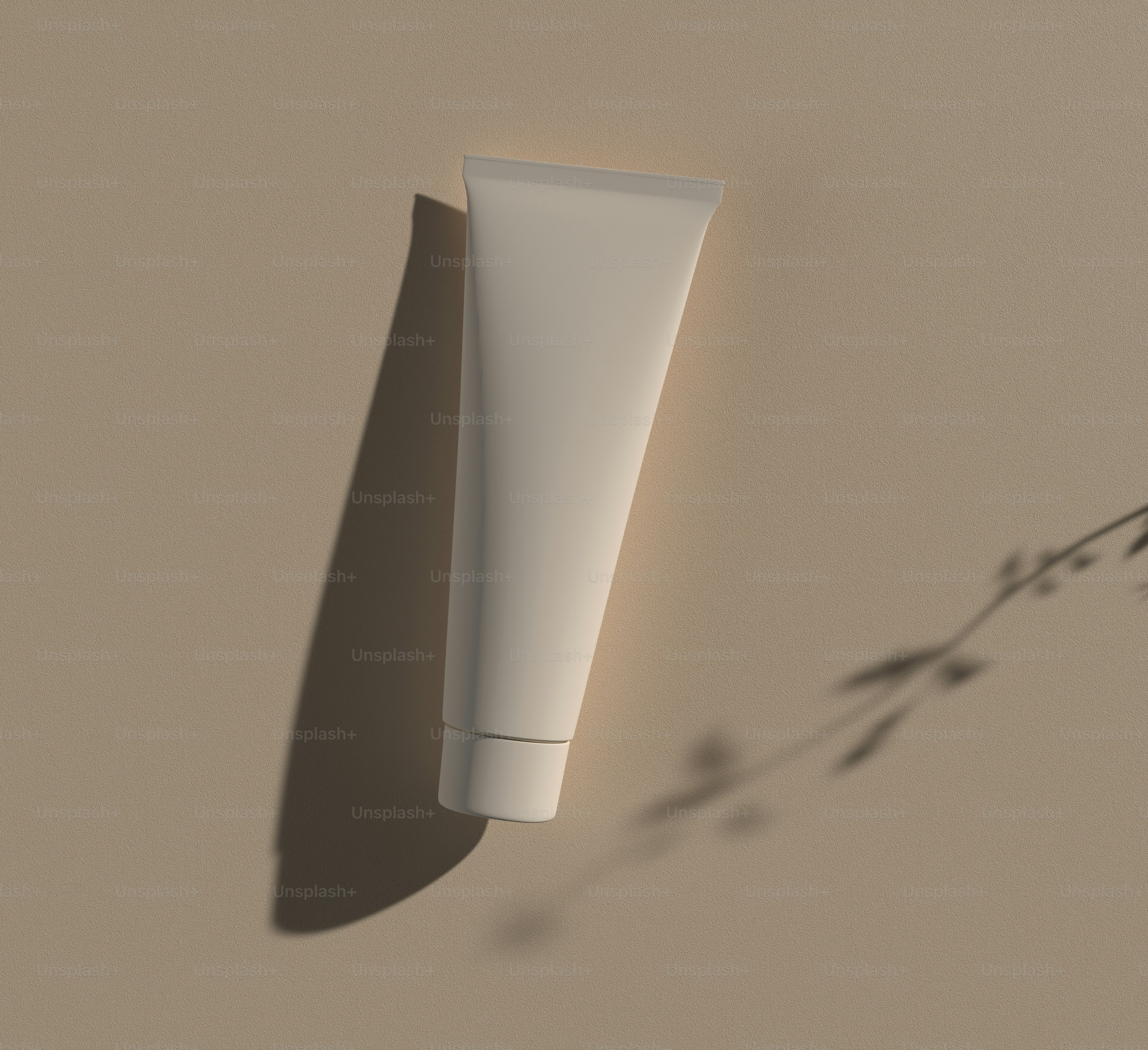 A tube of cream sitting on top of a table photo – Wallpaper Image on ...