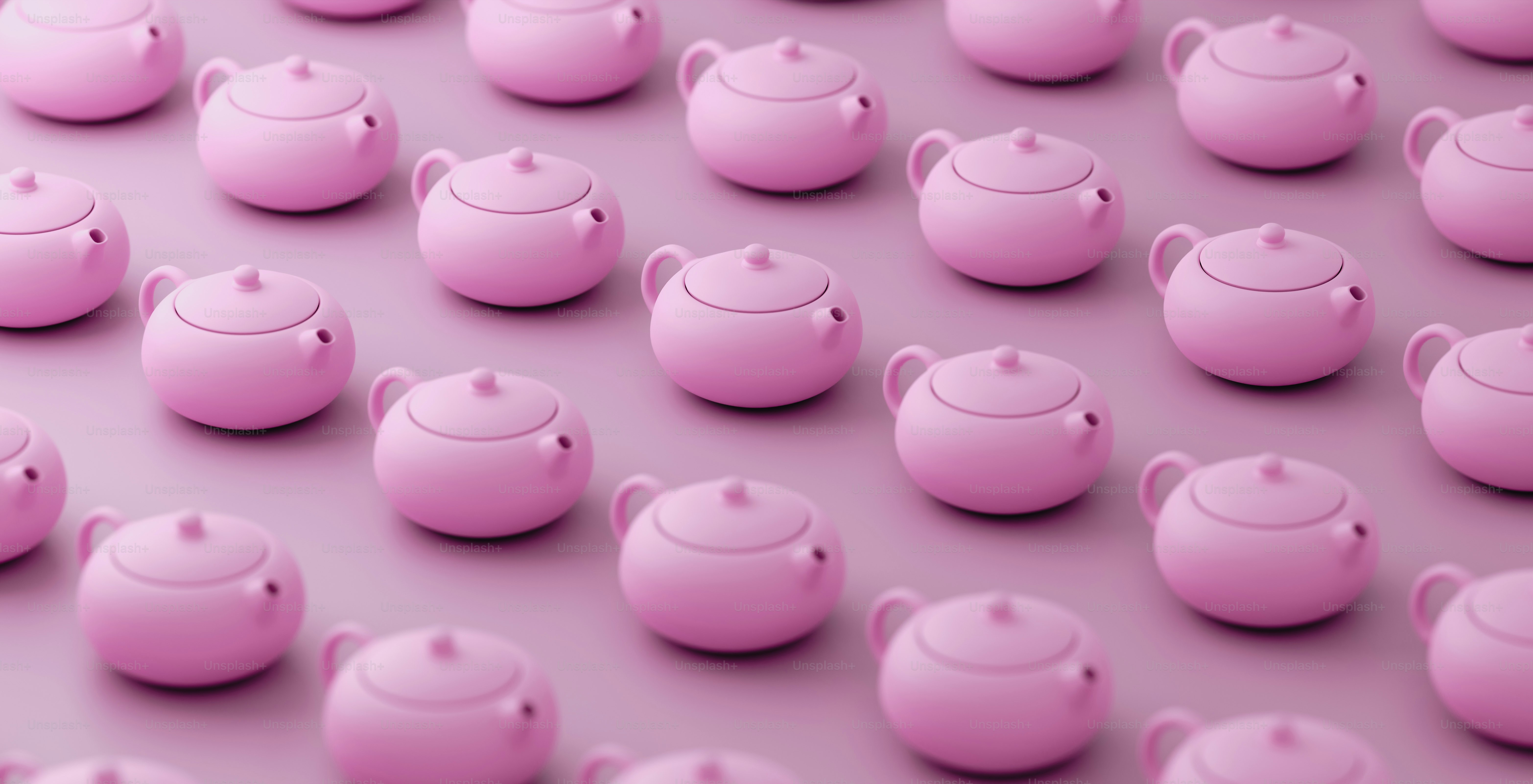 A group of pink teapots sitting next to each other photo – Pink Image ...