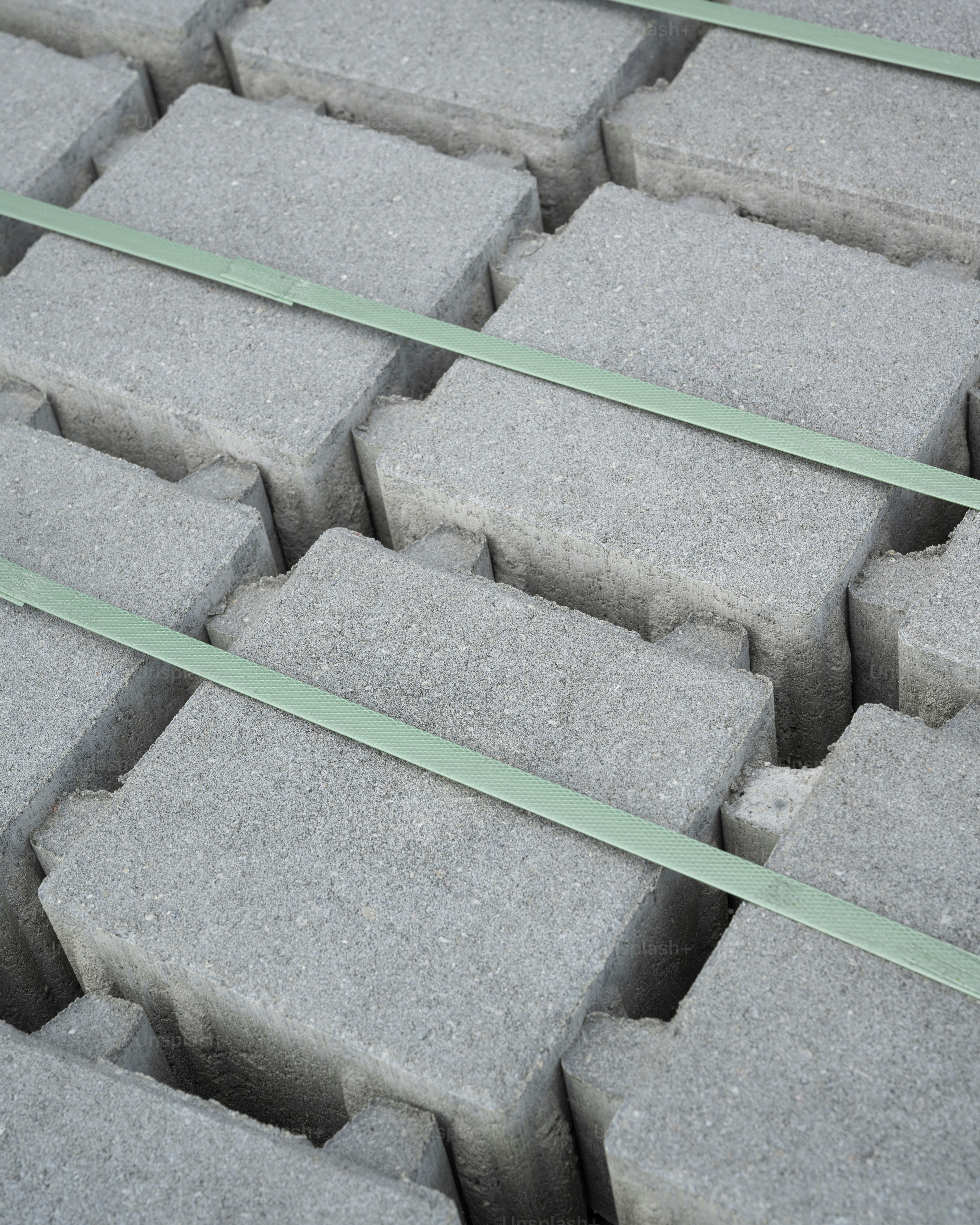A close up of a bunch of cement blocks photo – Berlin Image on Unsplash