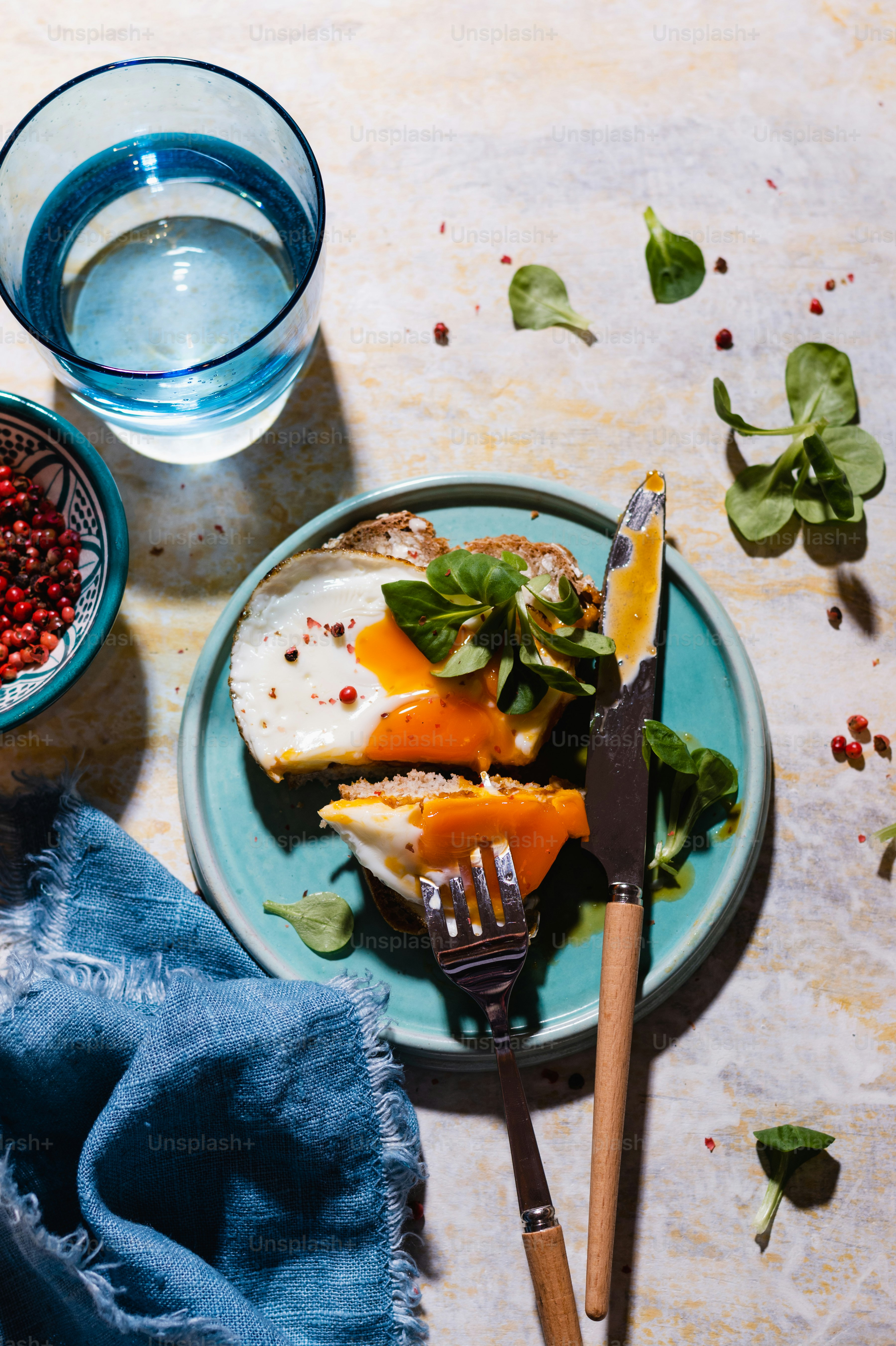 A plate of food and a glass of water photo – Food Image on Unsplash