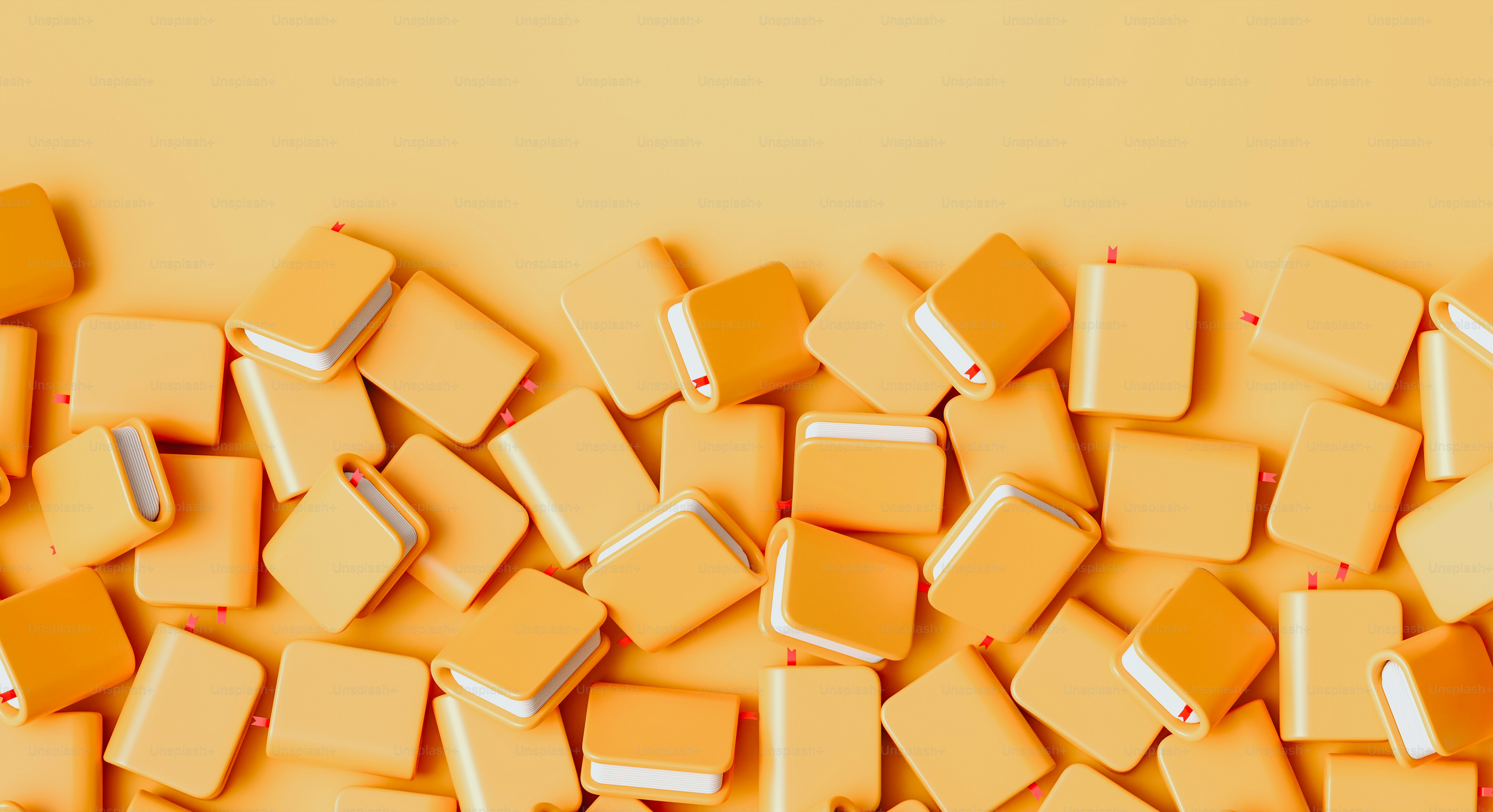 A pile of yellow books laying on top of each other photo – Yellow Image ...