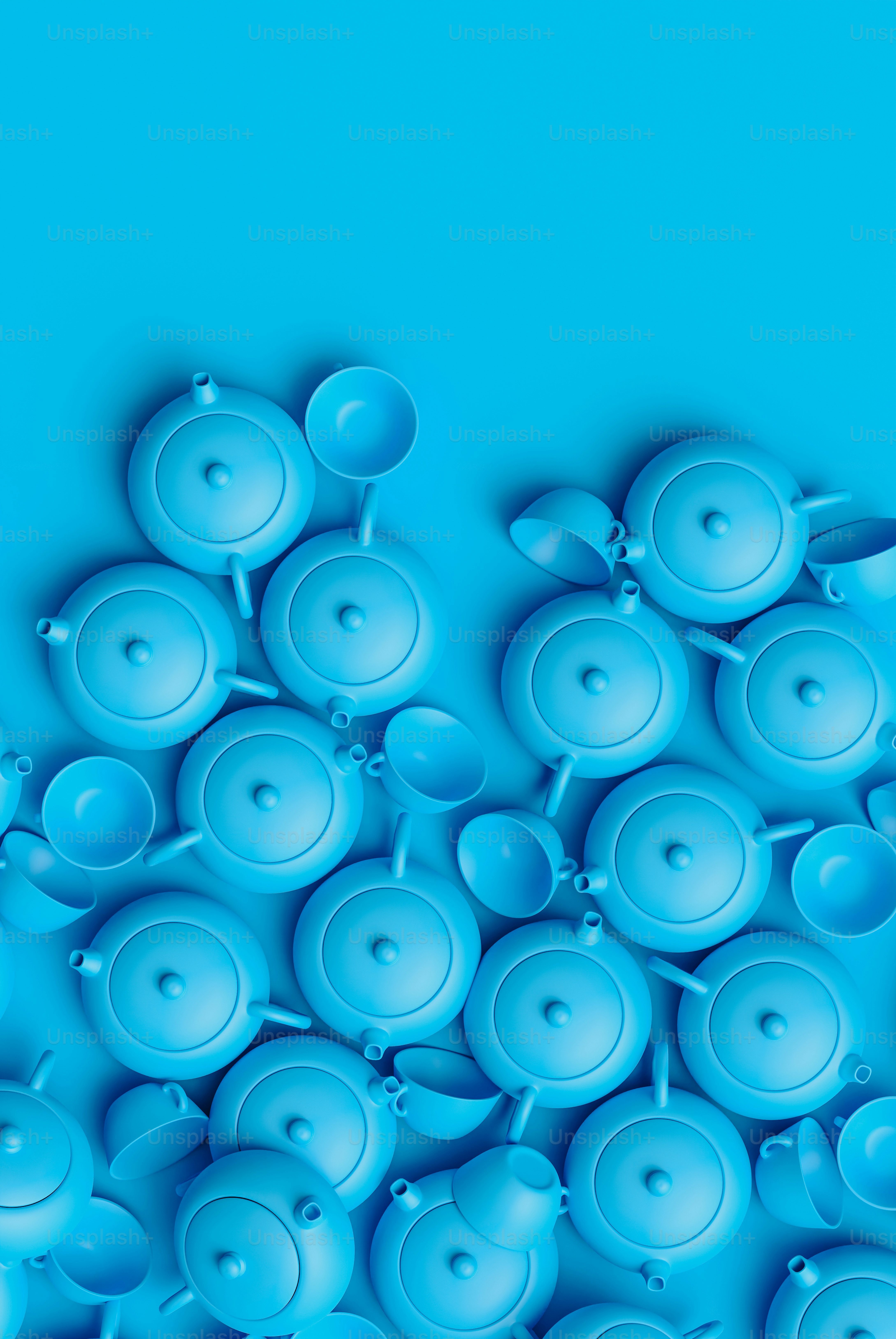 A group of blue teapots sitting next to each other photo – Blue color ...