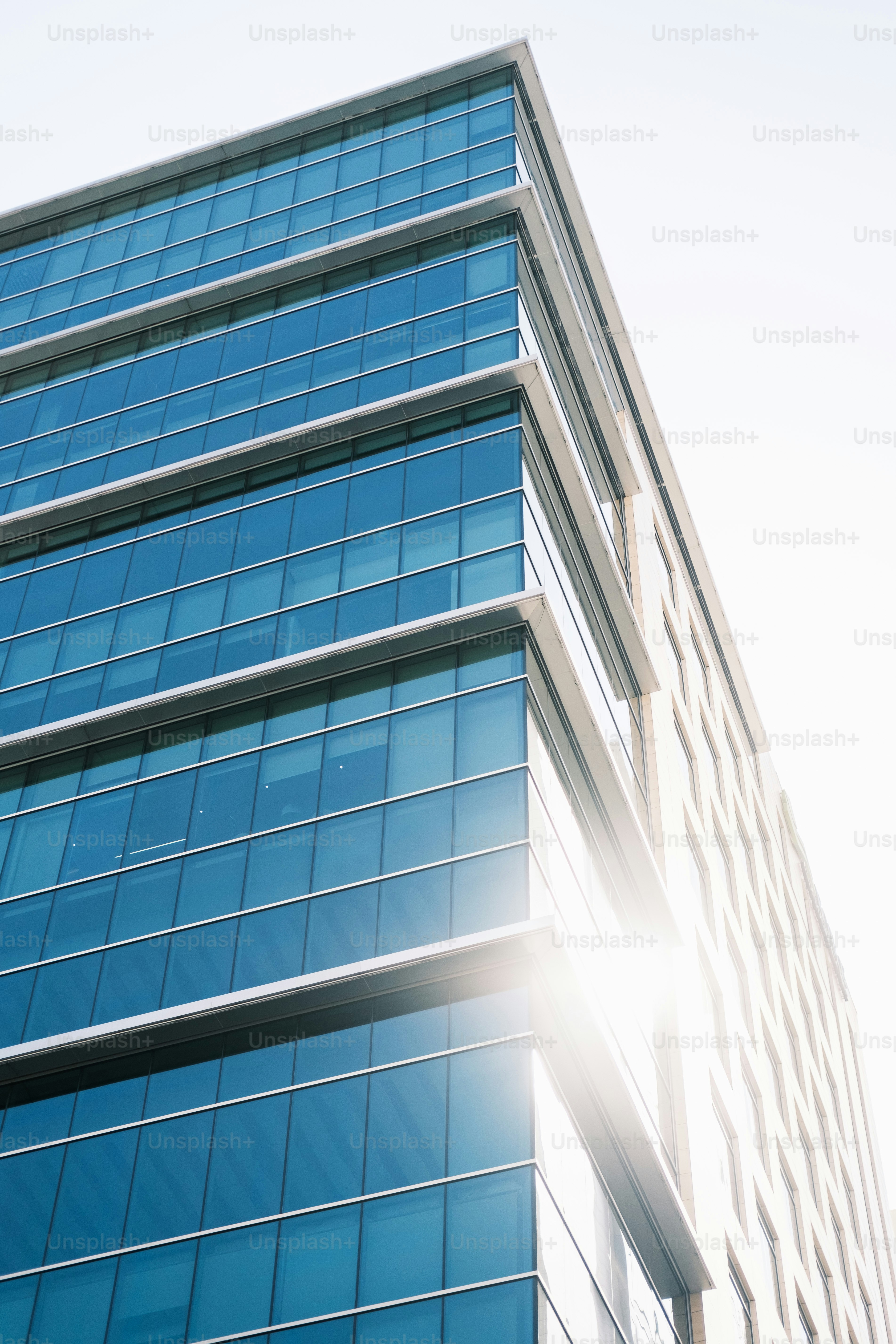 A very tall building with a lot of windows photo – Architecture Image ...