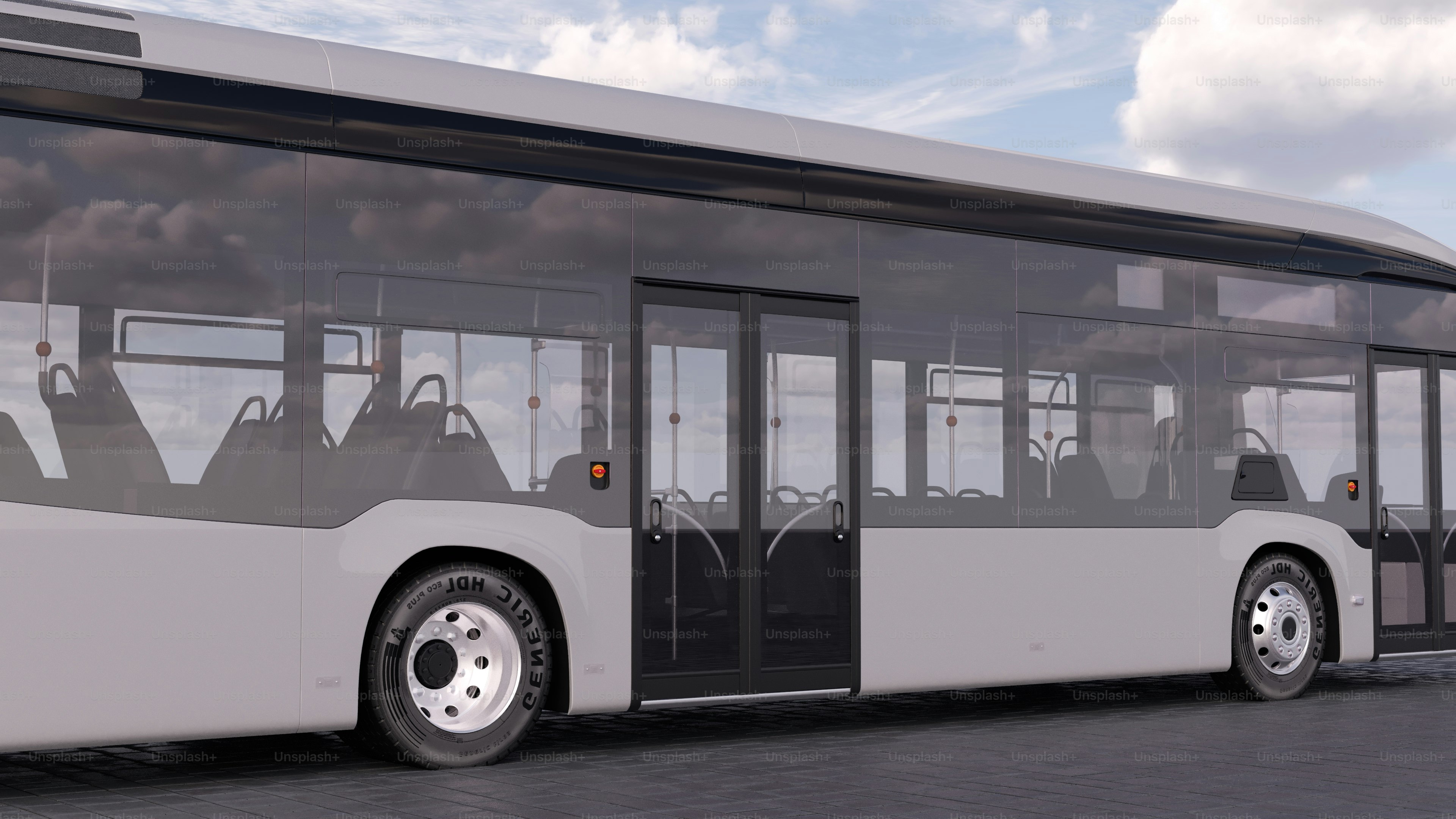 A large white bus parked on the side of the road photo – Screensaver ...