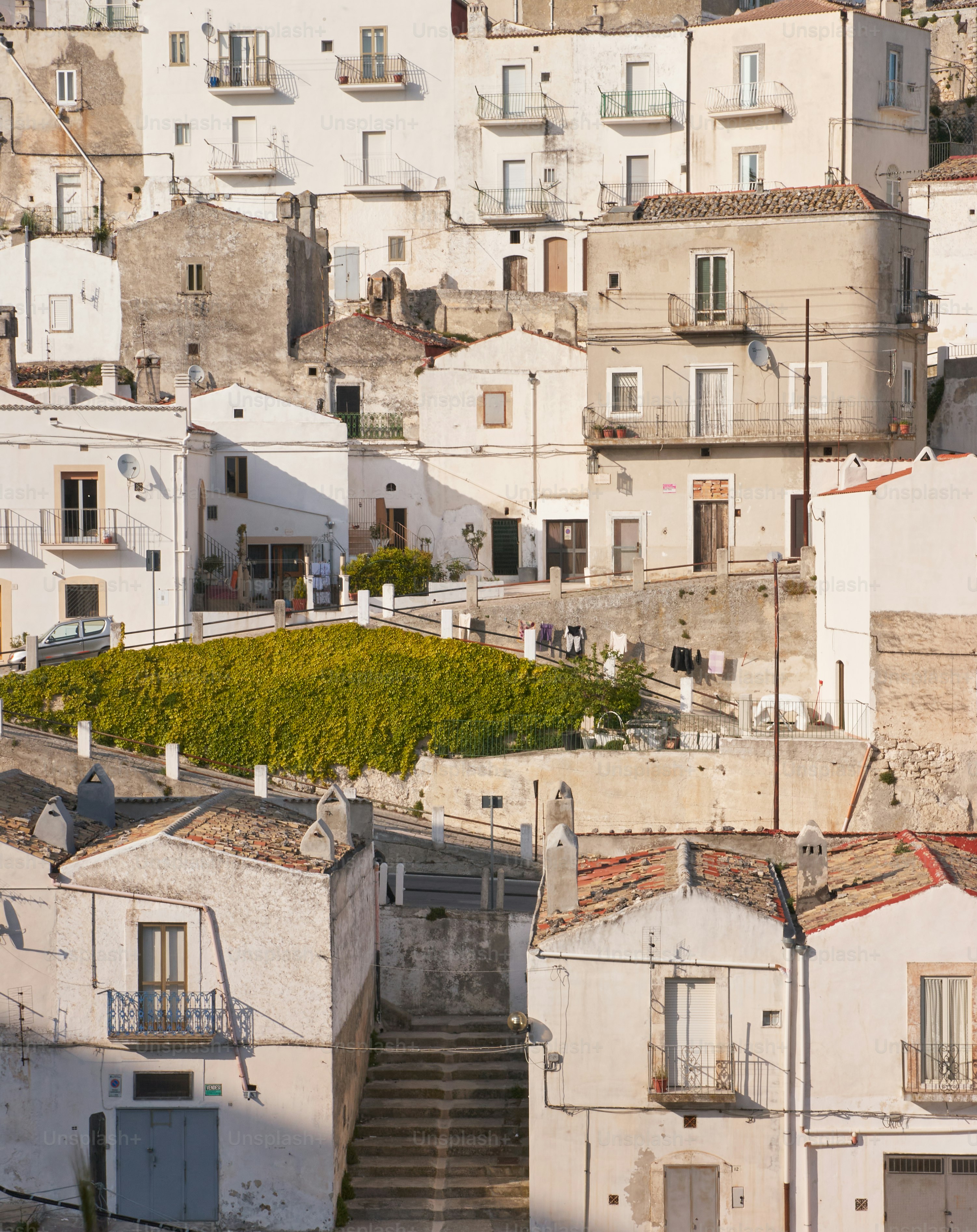 A bunch of buildings that are next to each other photo – City Image on ...