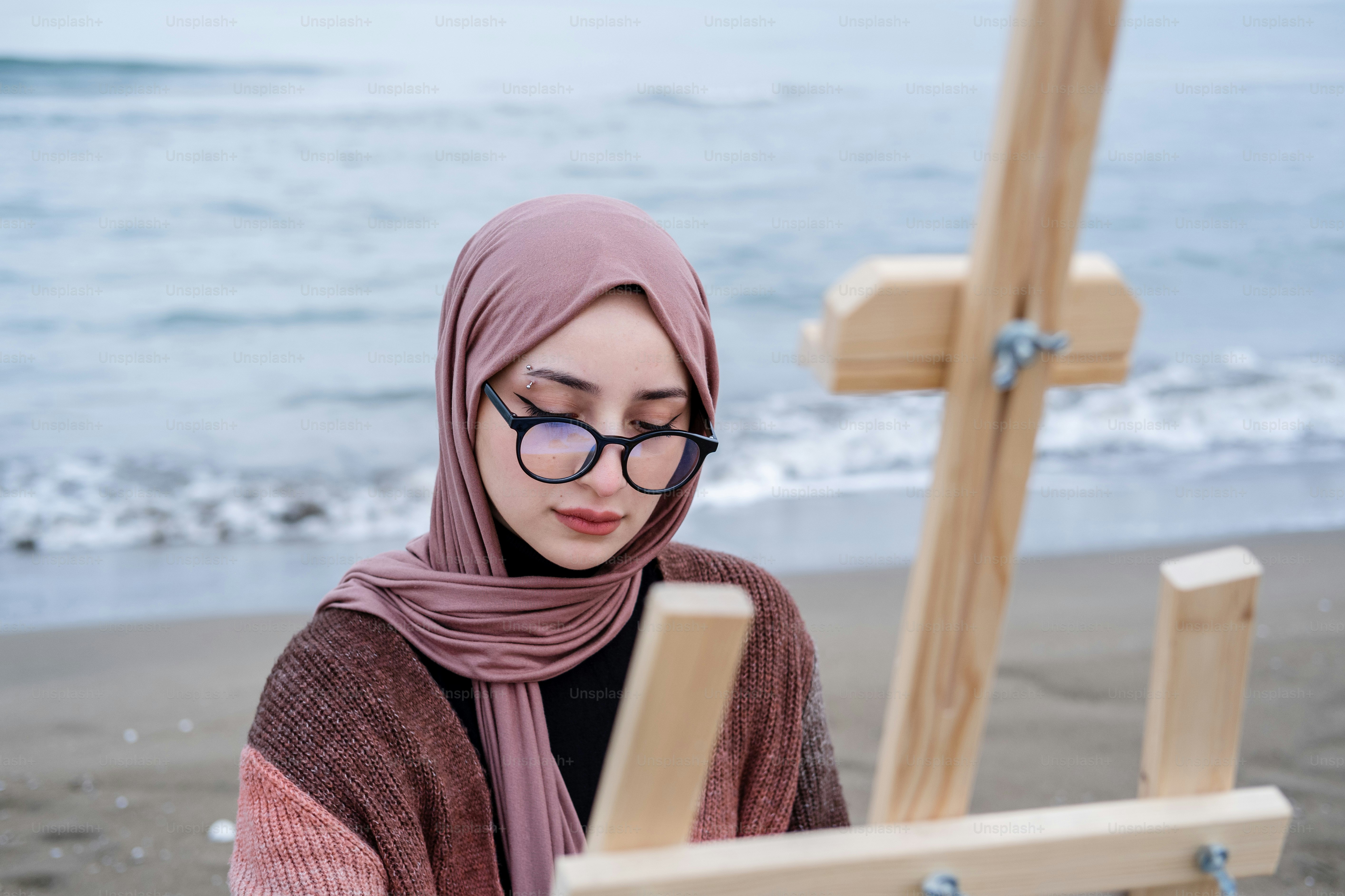 A person drawing a picture on a piece of paper photo – Drawing Image on ...