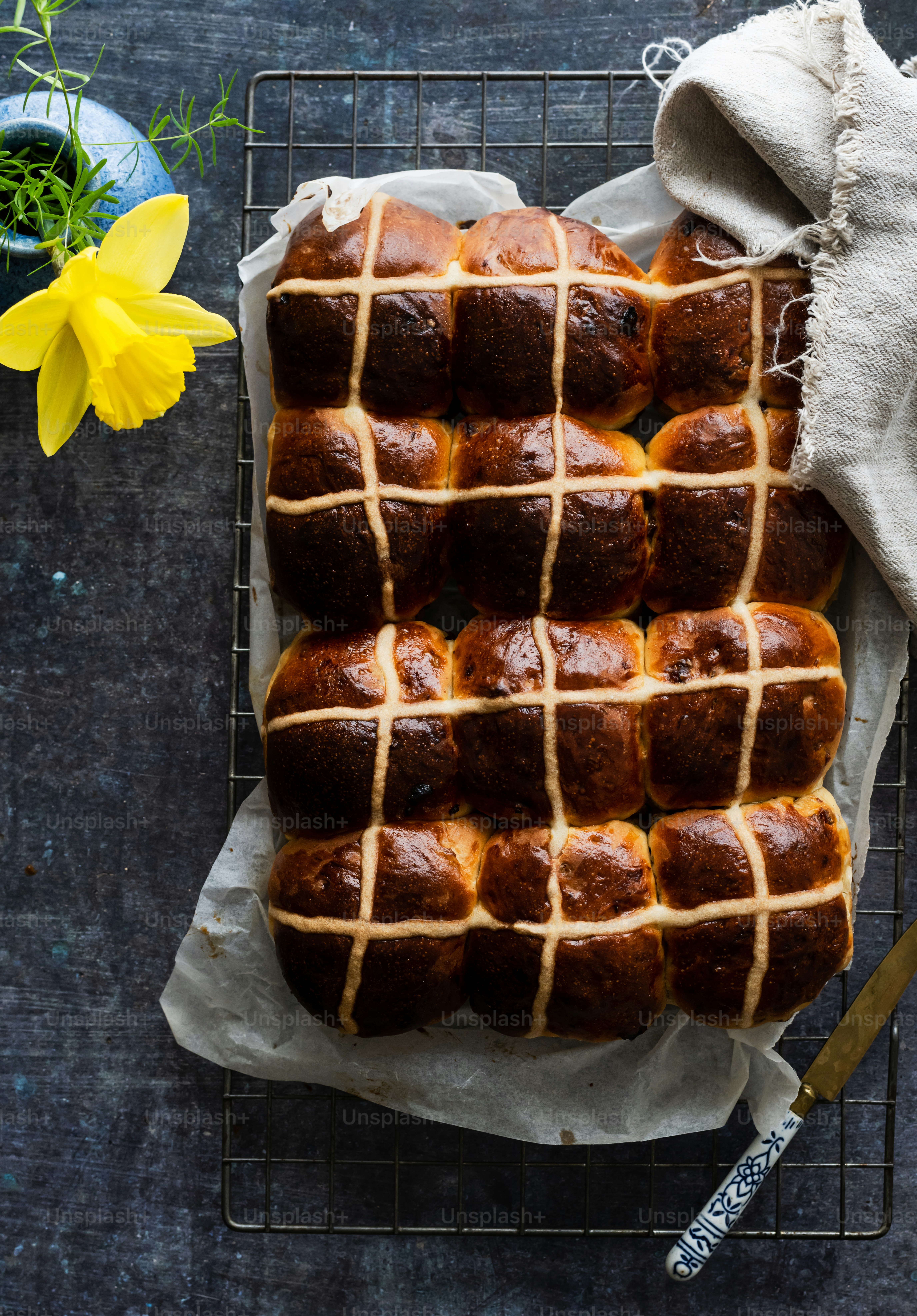A bunch of hot cross buns on a cooling rack photo – Spring Image on ...