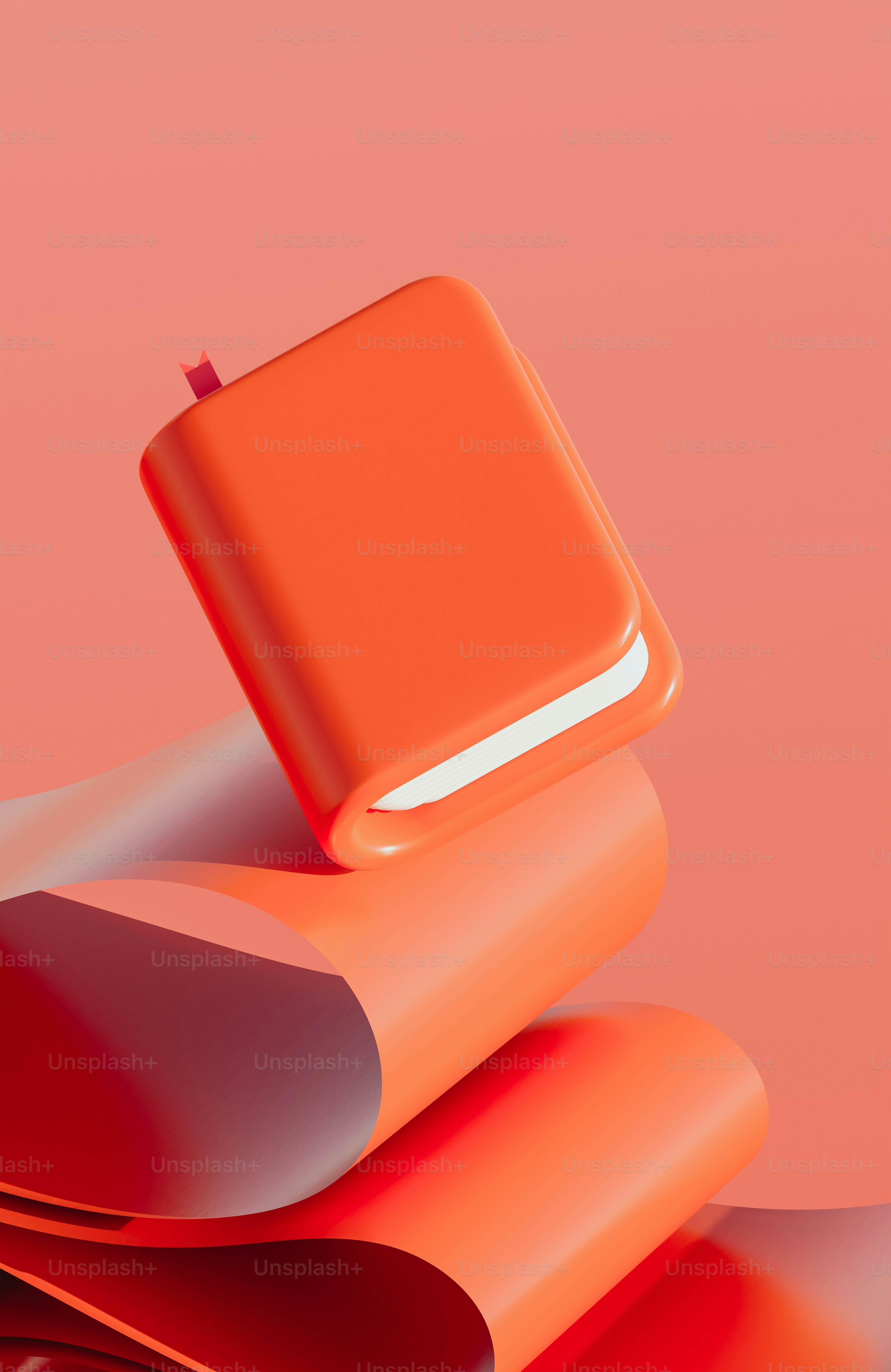 A stack of orange books on a pink background photo – Book Image on Unsplash