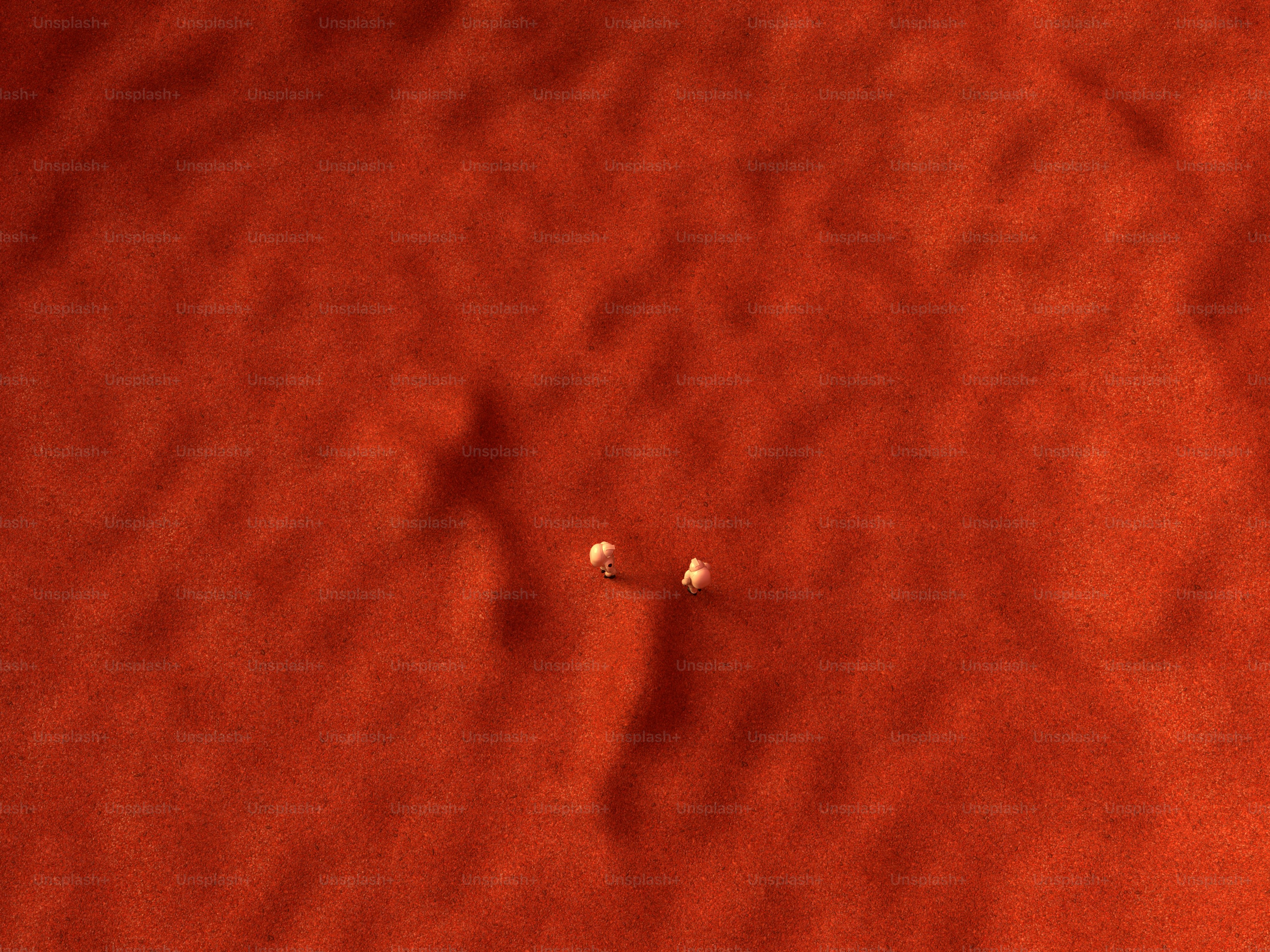 Two small white objects on a red surface photo – Space Image on Unsplash