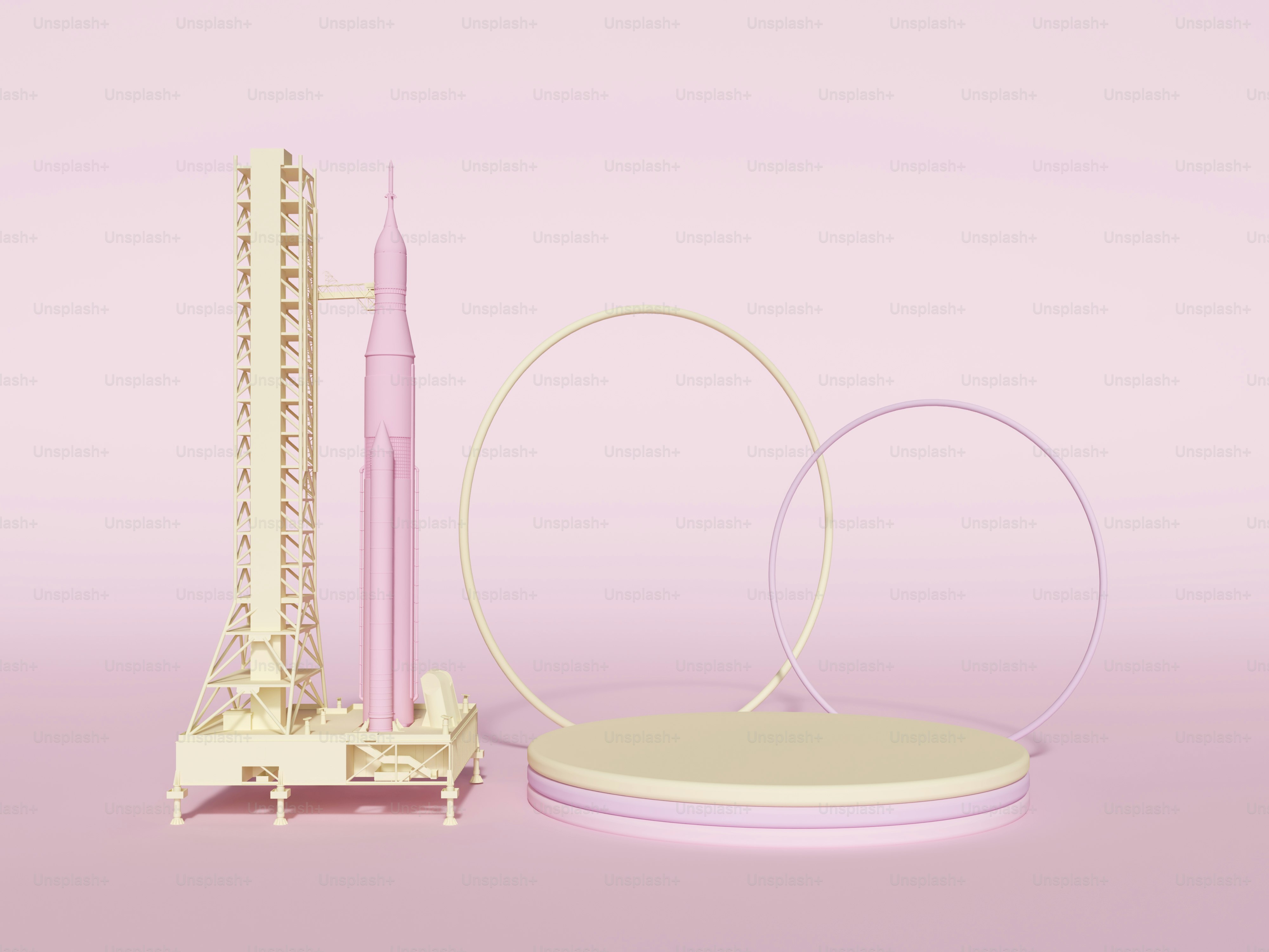 A pink and white model of a rocket and its stand photo – Rockets Image ...