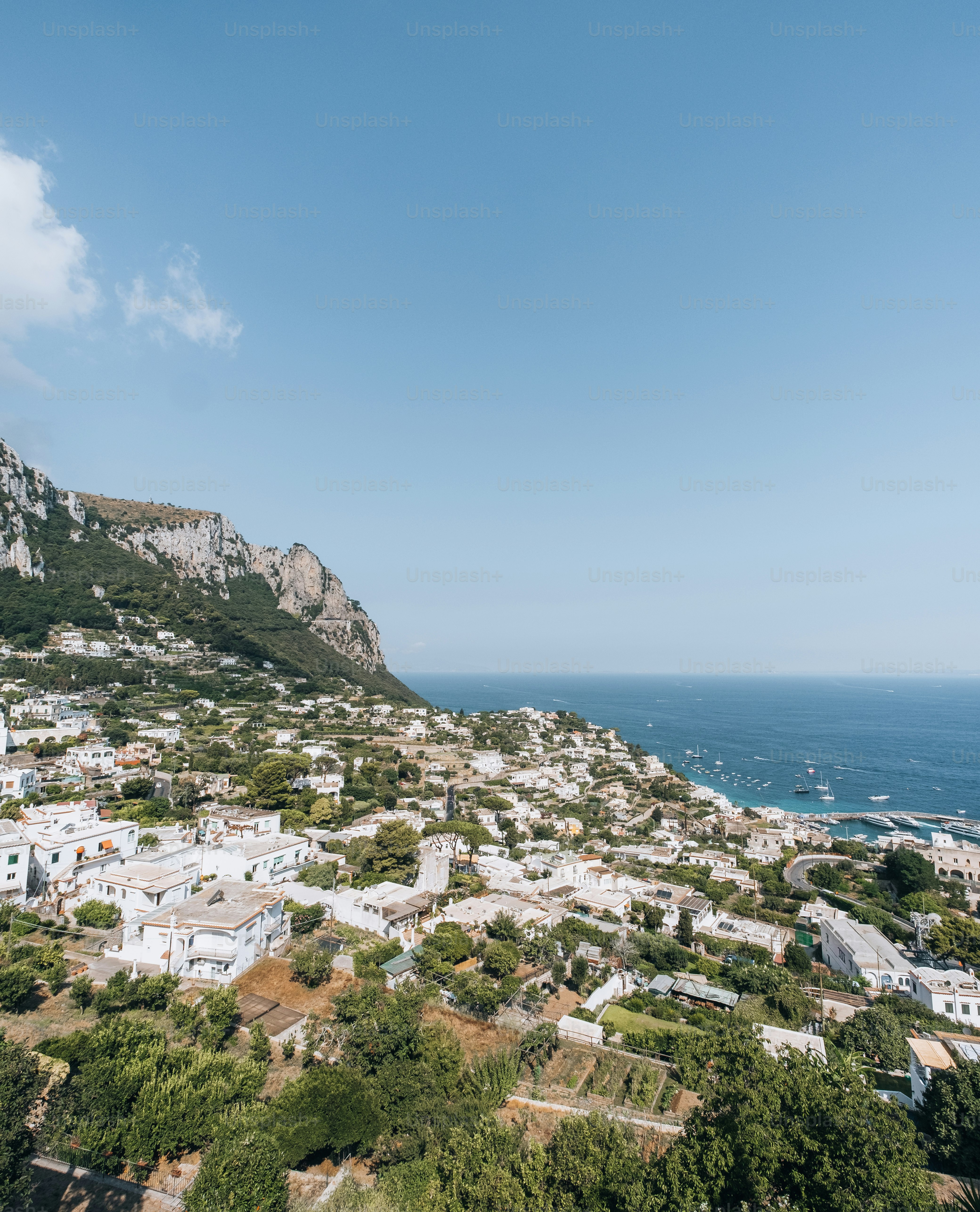 An aerial view of a town near the ocean photo – Capri Image on Unsplash