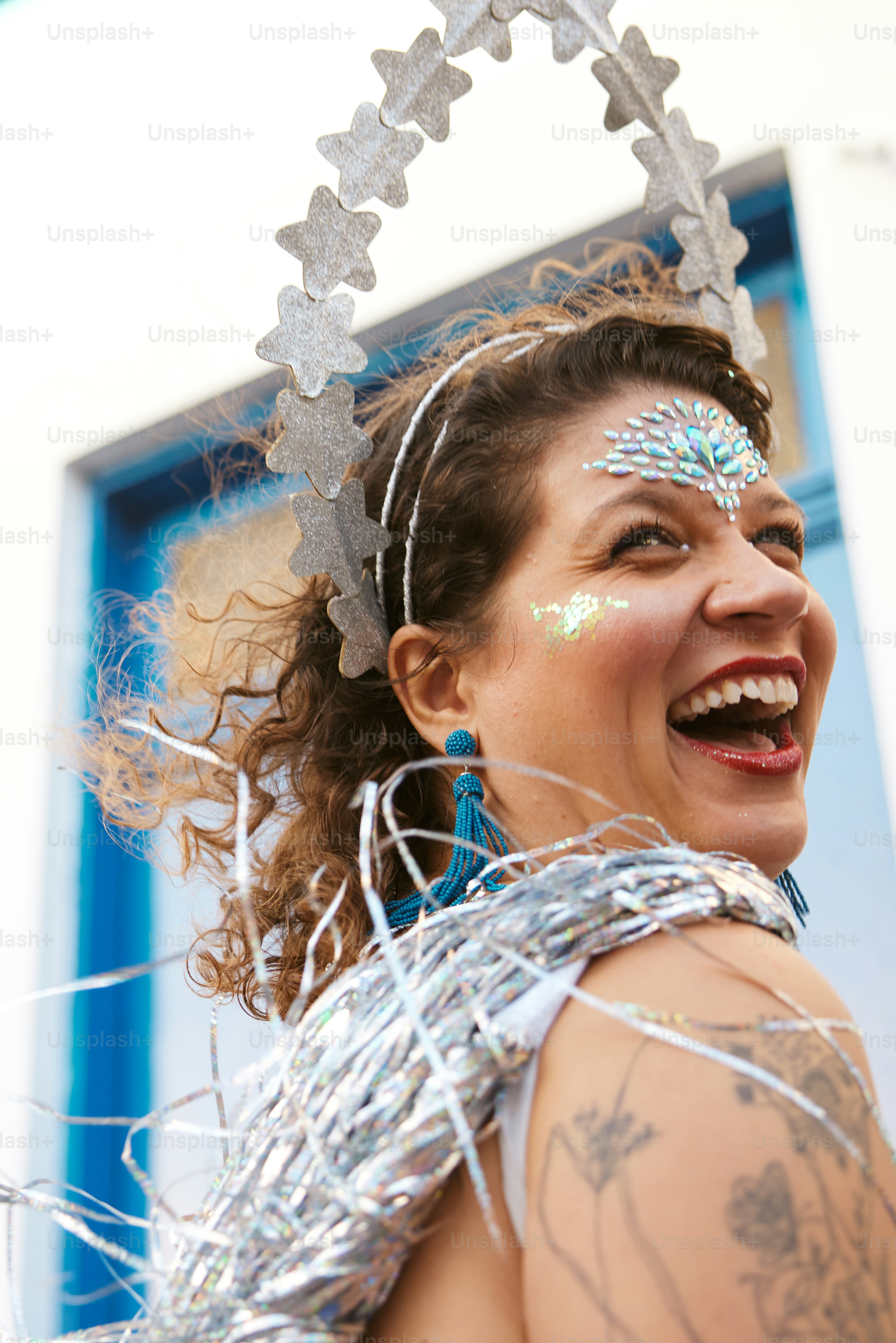 A woman wearing a silver costume and a tiara photo – Celebrating Image ...