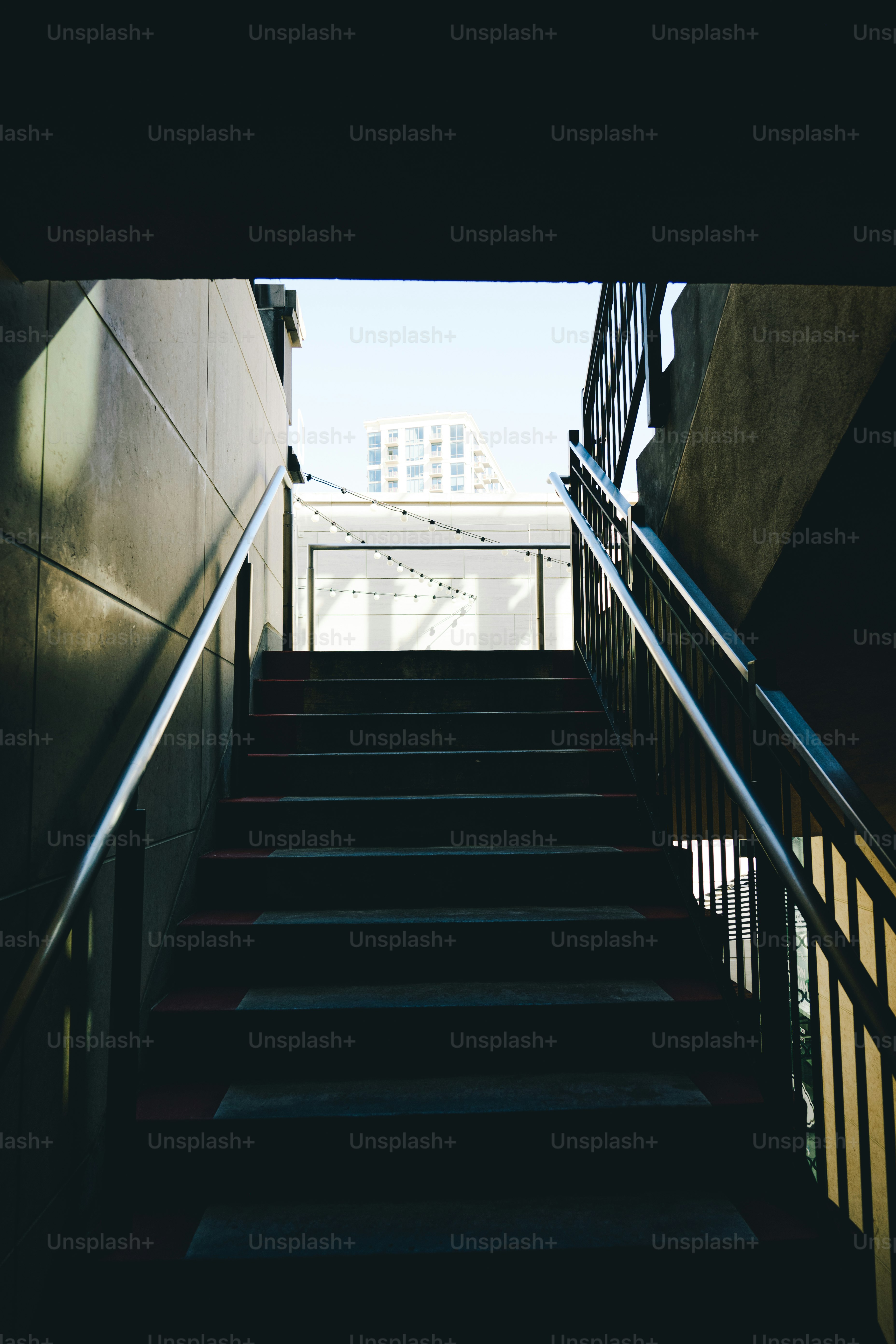 A set of stairs leading up to a building photo – Levels Image on Unsplash