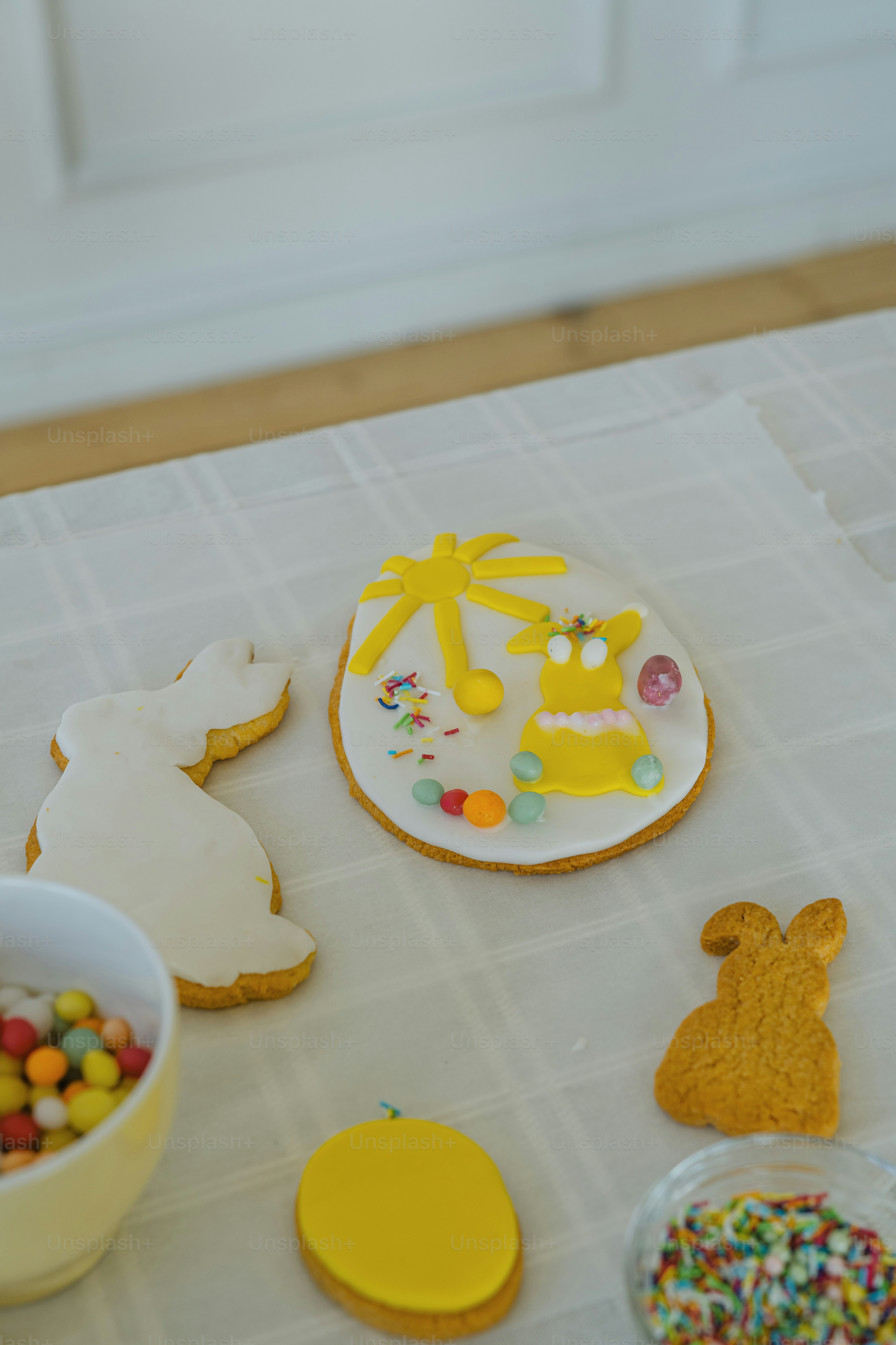 A table topped with lots of decorated cookies photo – Eggs Image on ...