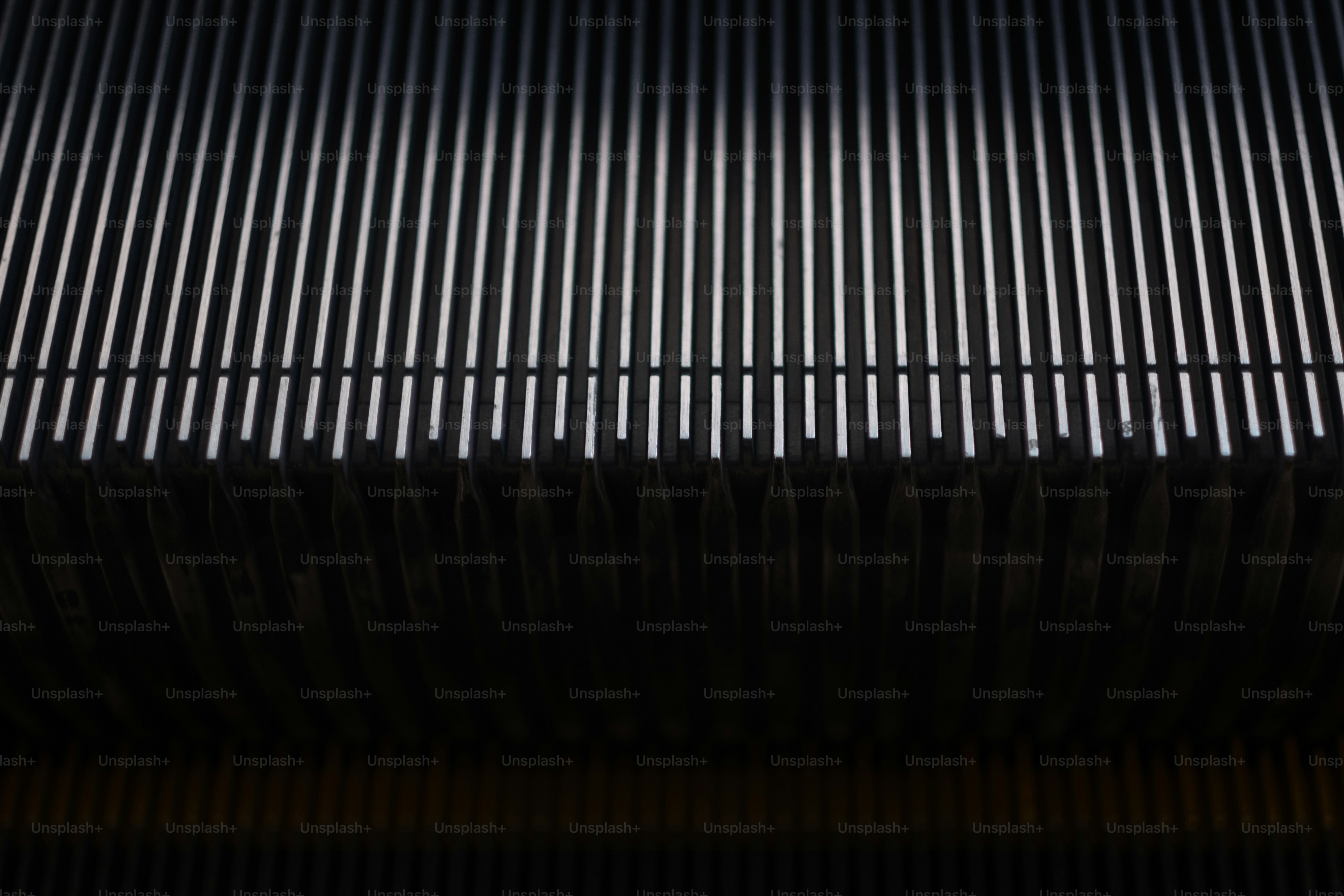 A close up of a metal grill grilling photo – Escalator Image on Unsplash