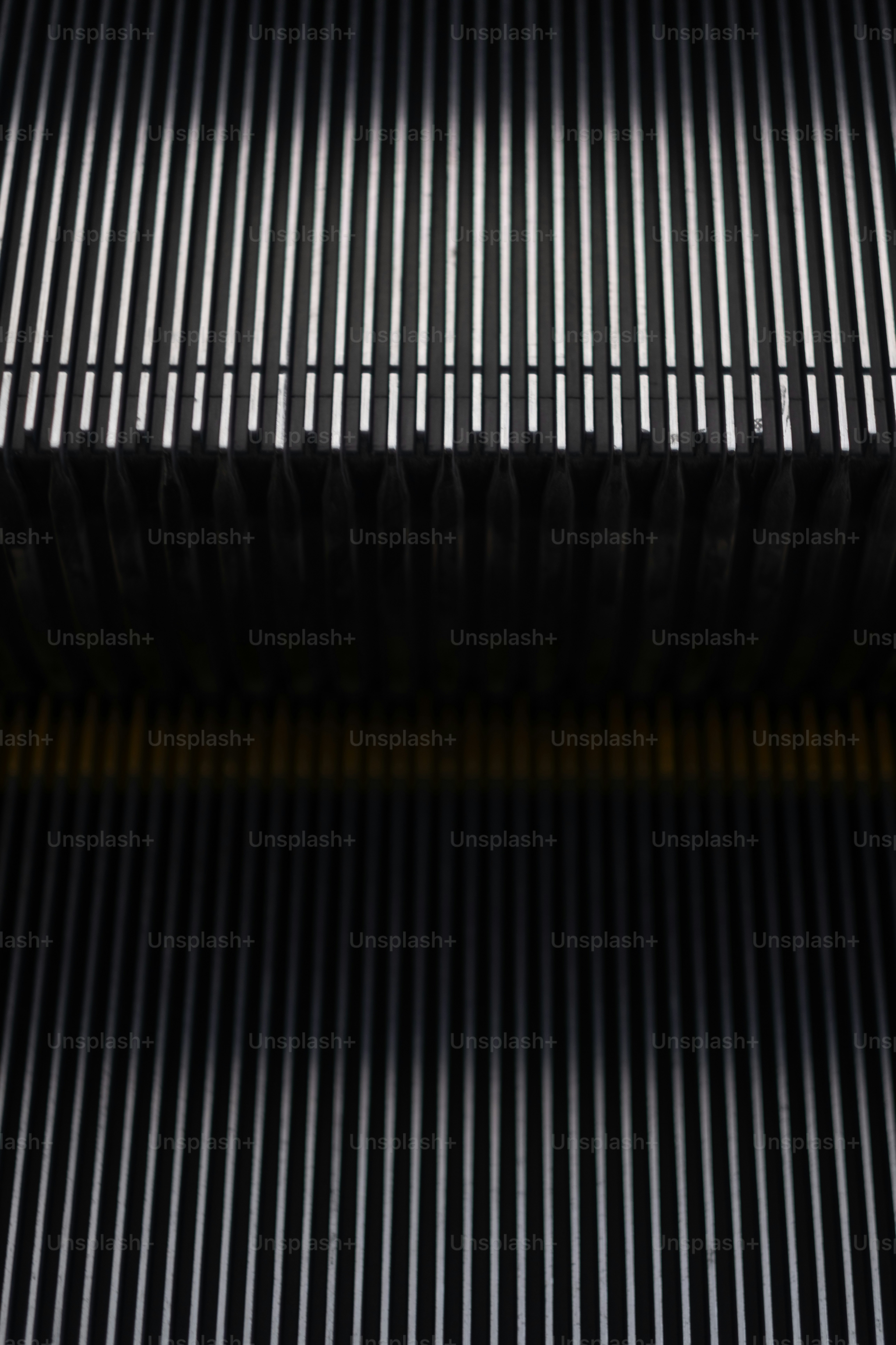 A close up of a metal grill grilling photo – Escalator Image on Unsplash