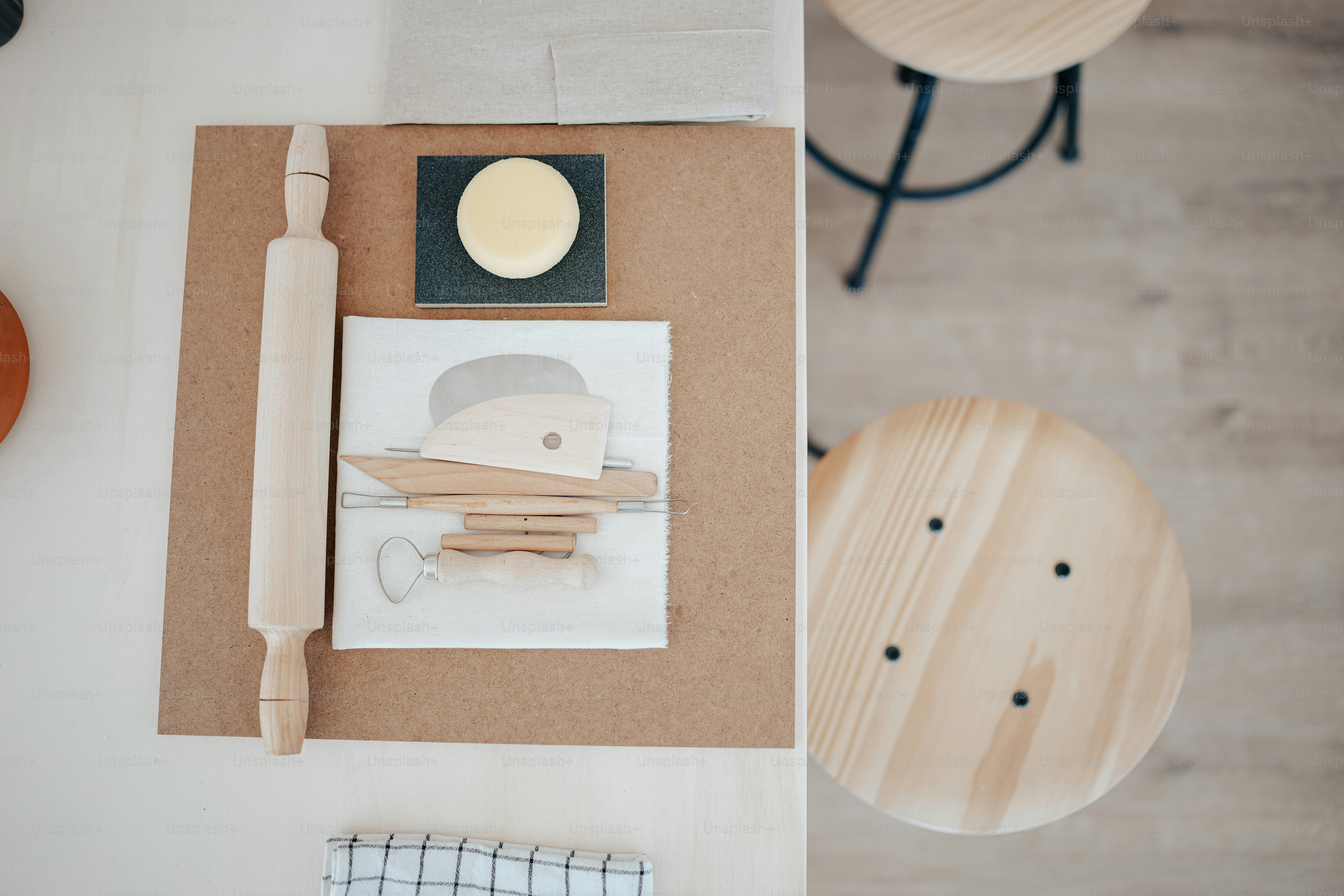 An overhead view of a table with a craft kit on it photo – Stool Image ...