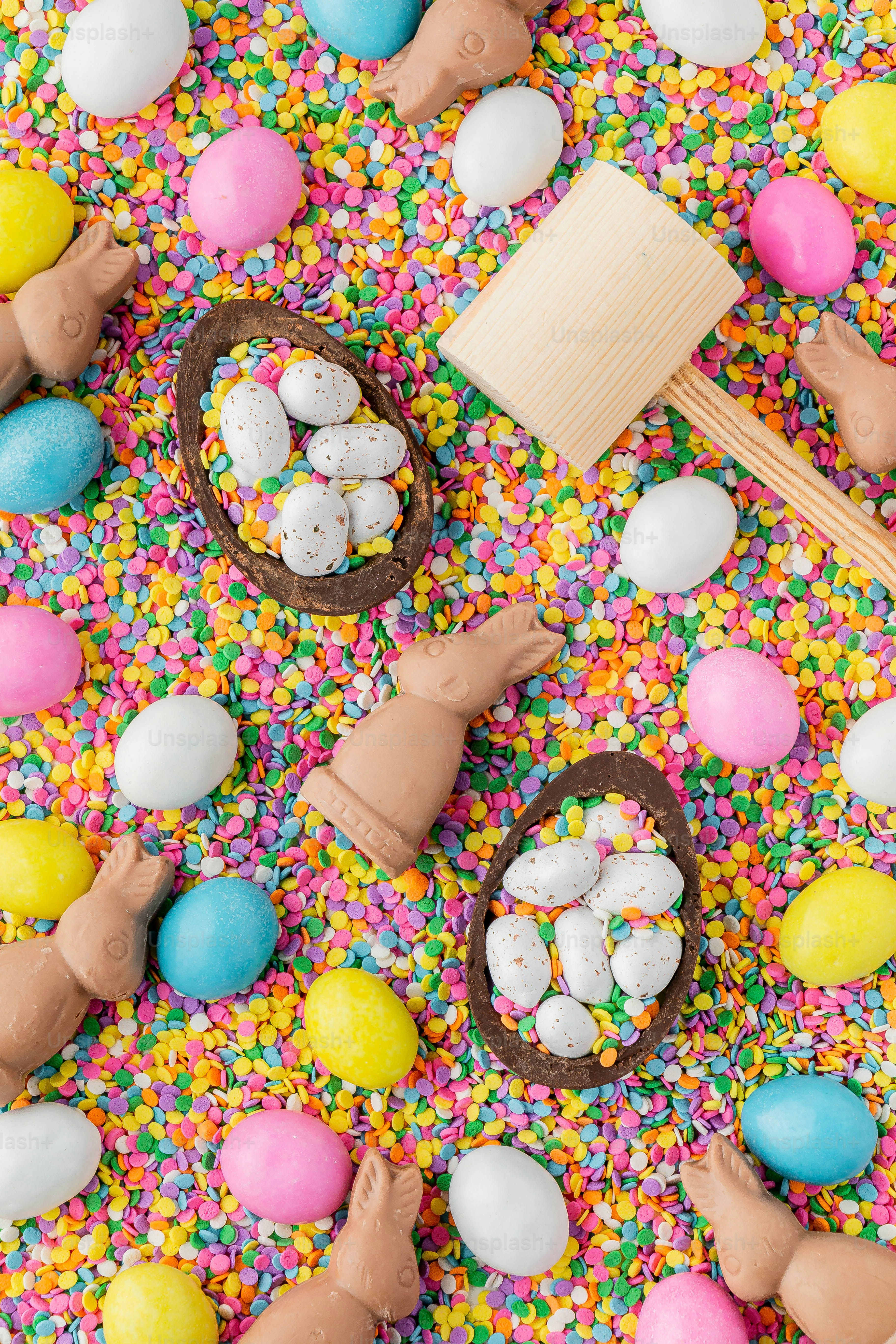 A table topped with lots of fake easter eggs photo – Easter Image on ...