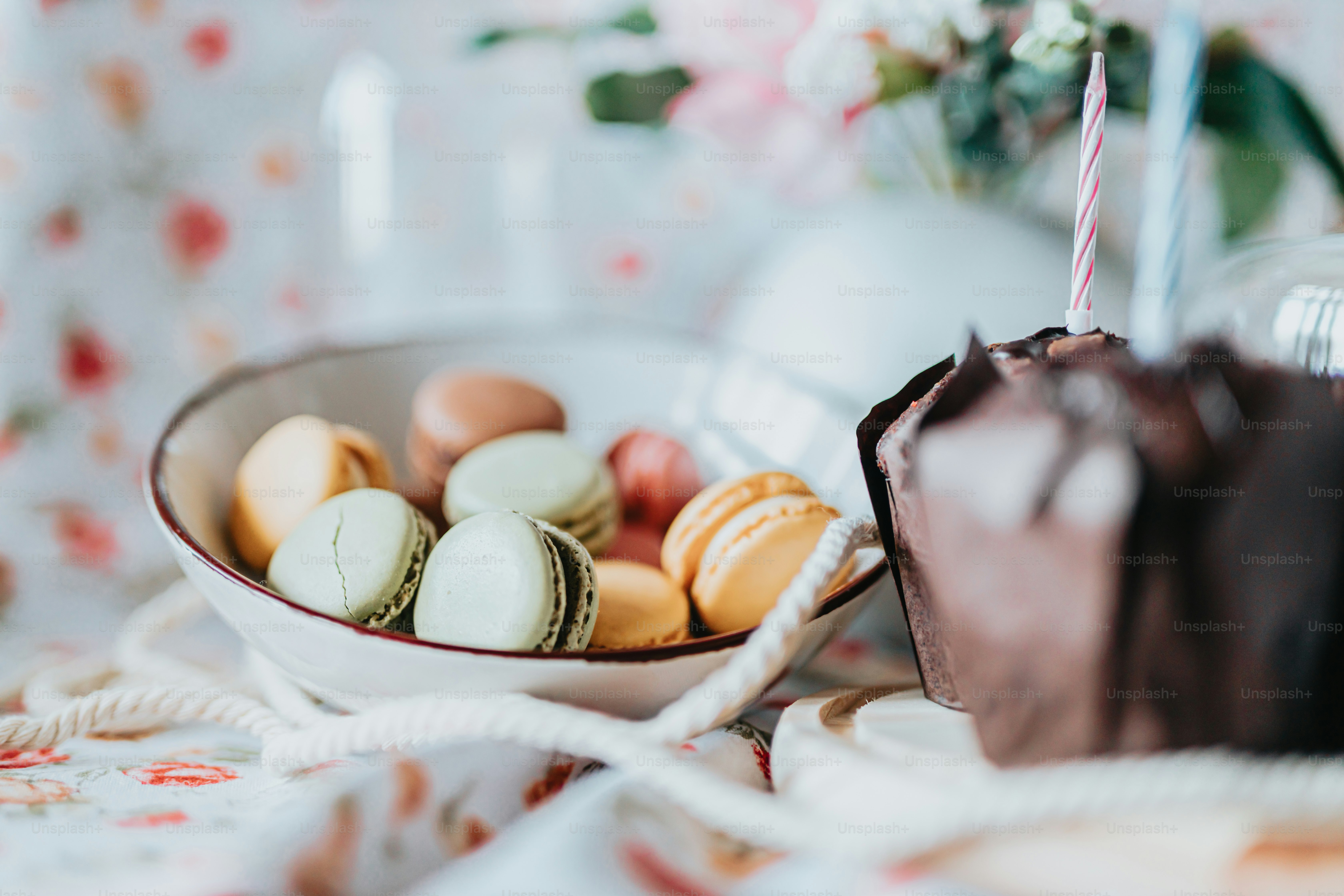 A bowl filled with assorted colored macaroons photo – Macarons Image on ...
