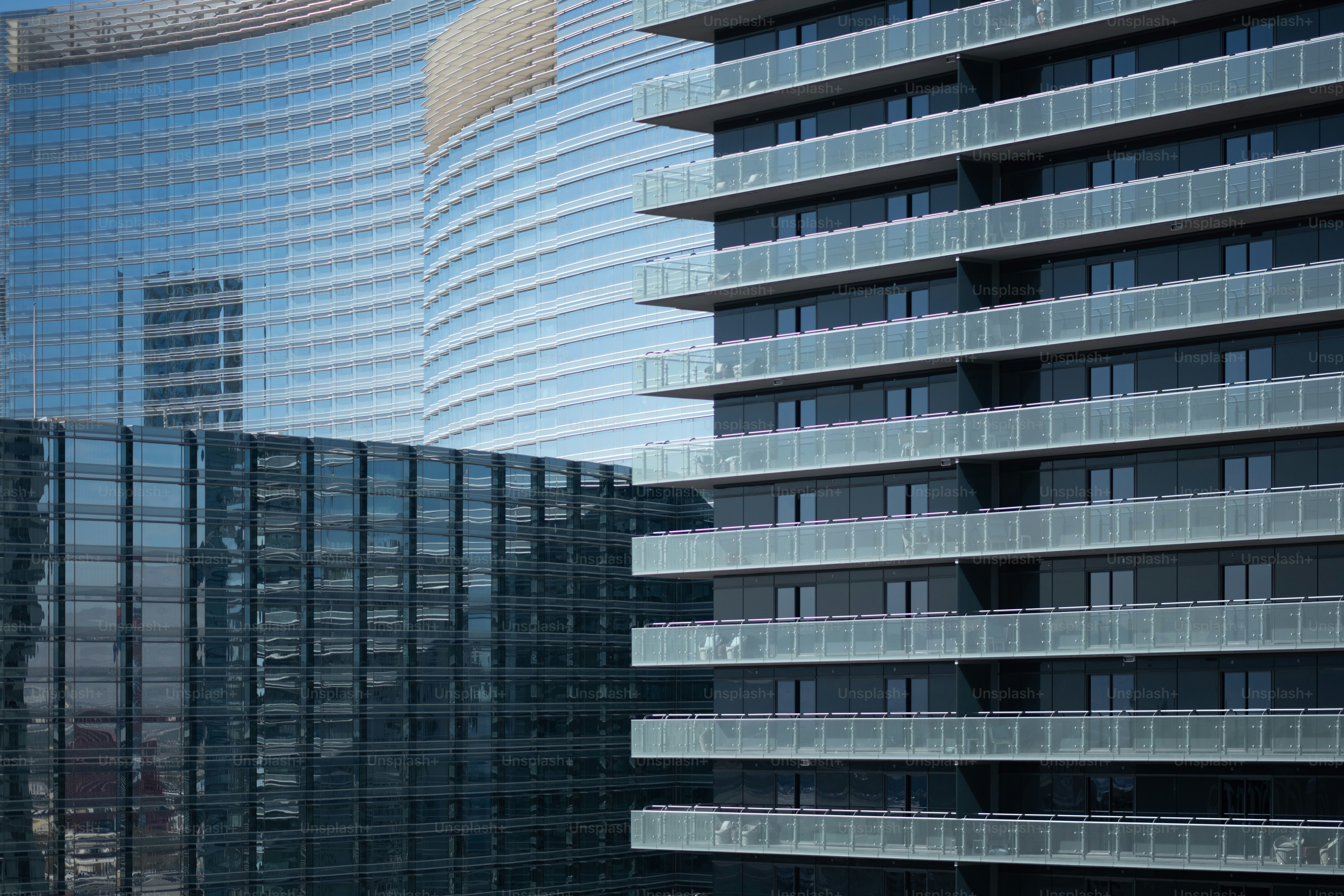 A very tall building next to a very tall building photo – Building ...