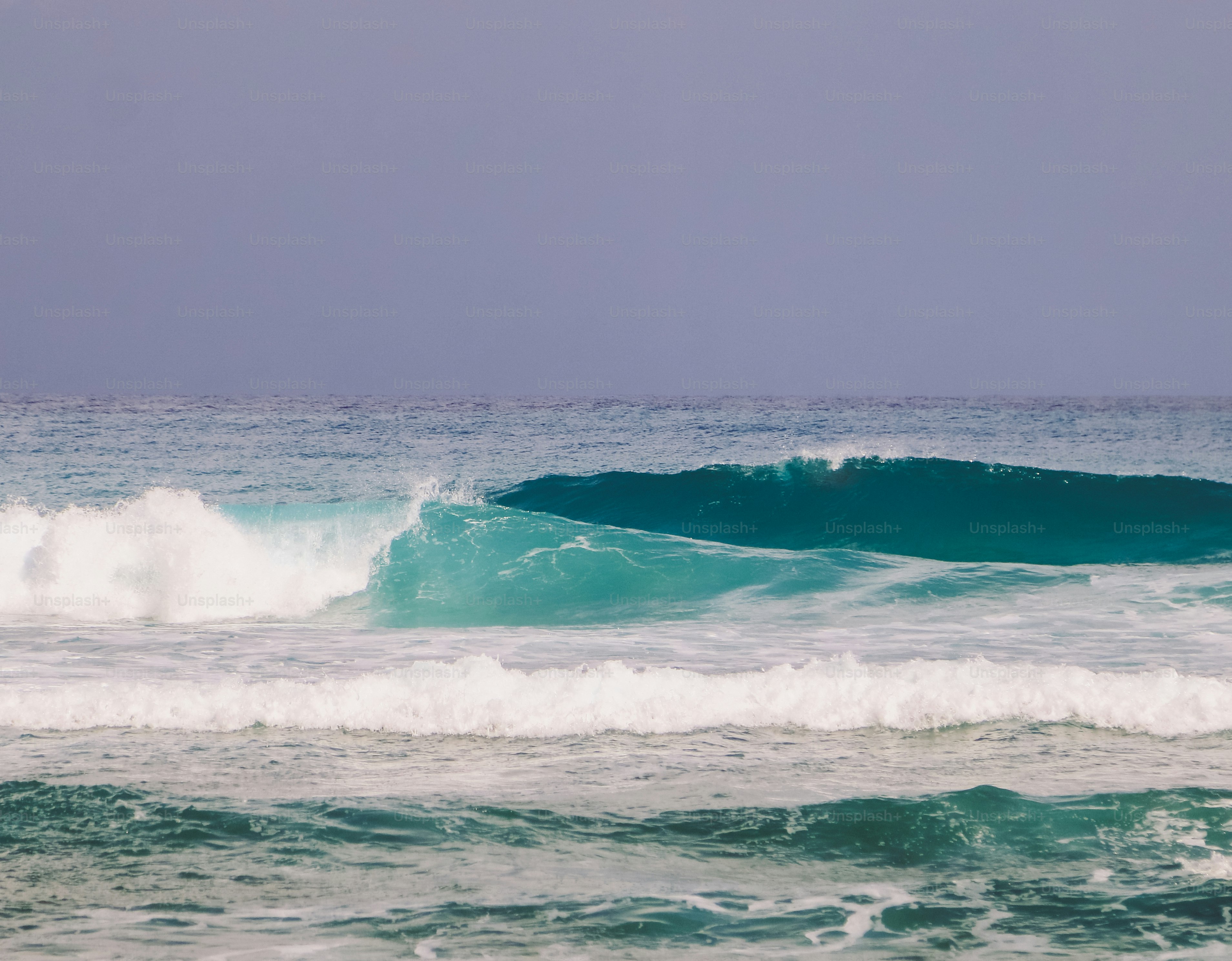 A person riding a wave on top of a surfboard photo – Sea wave Image on ...