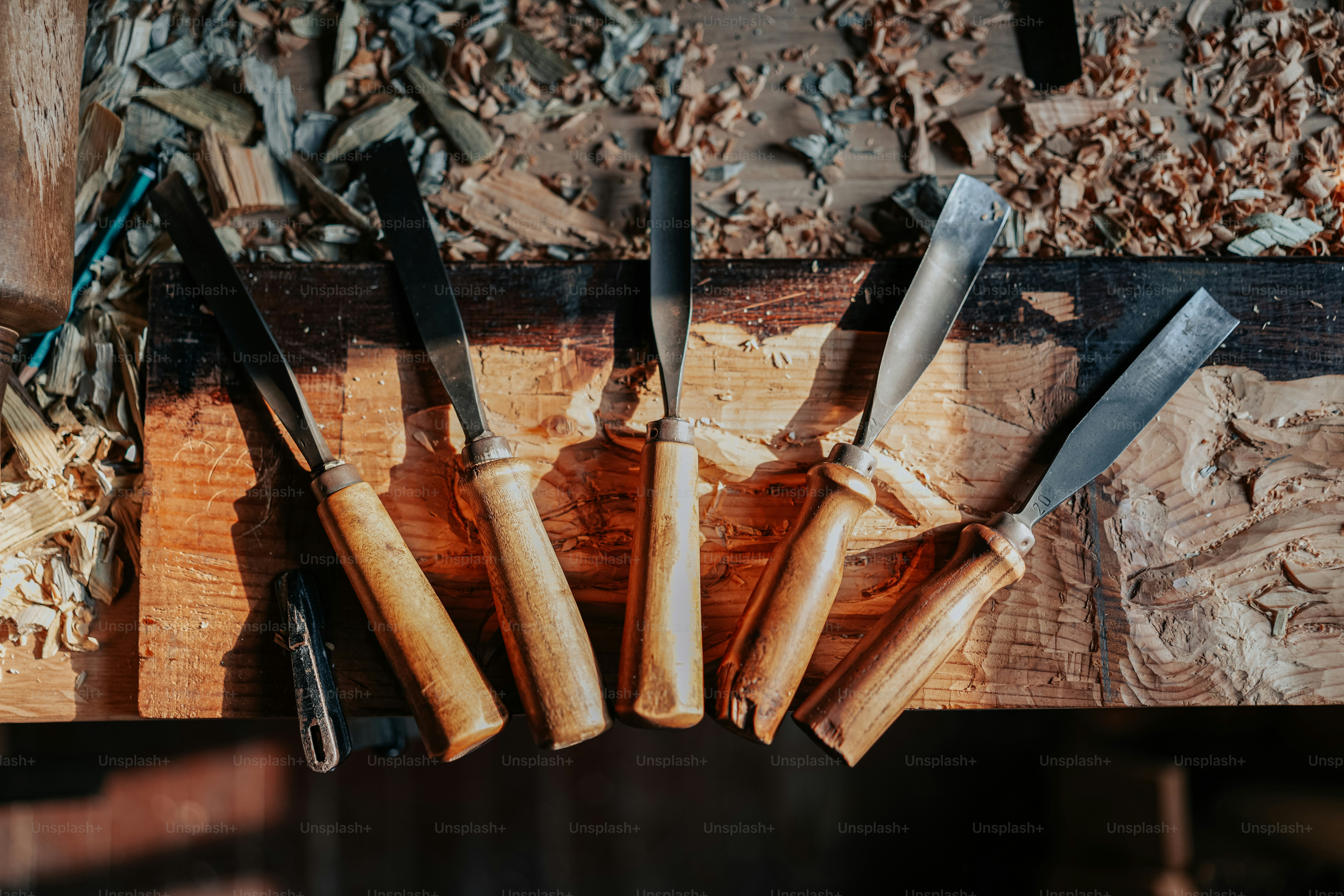 A bunch of tools hanging on a wall photo – Toolshed Image on Unsplash