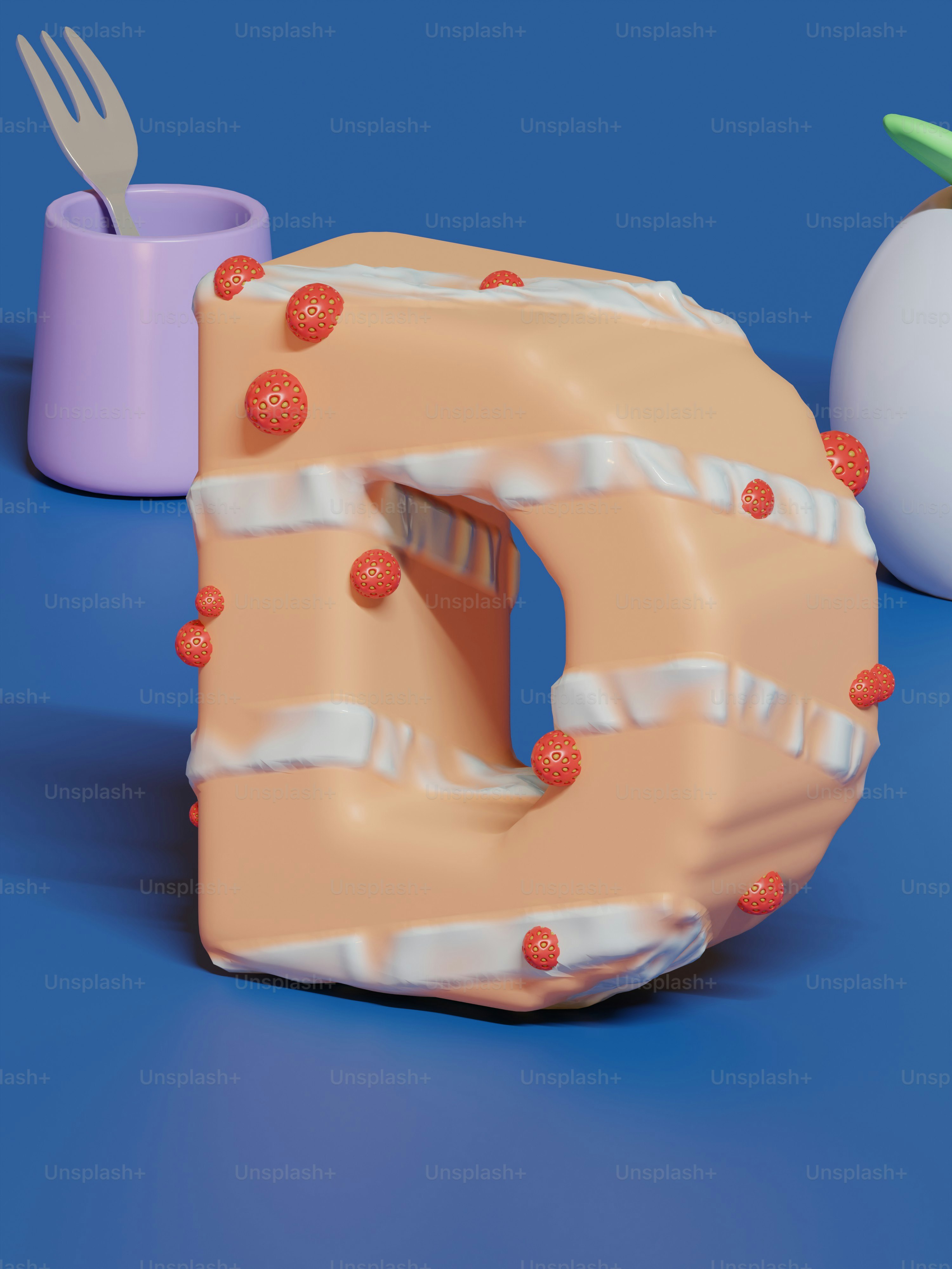 A cake shaped like the letter e next to a fork photo – Desktop ...